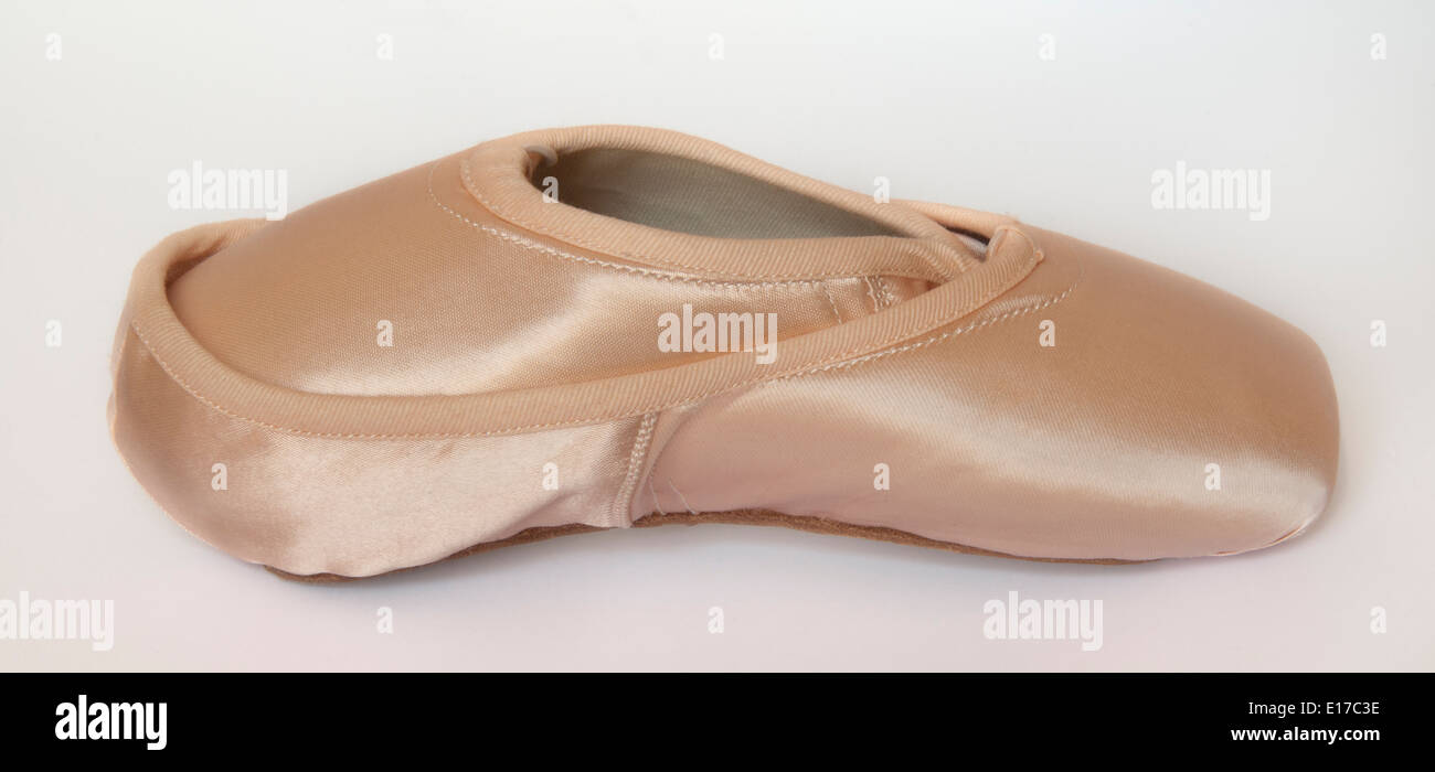 pair of pointe shoes together on white background with no ribbons Stock ...
