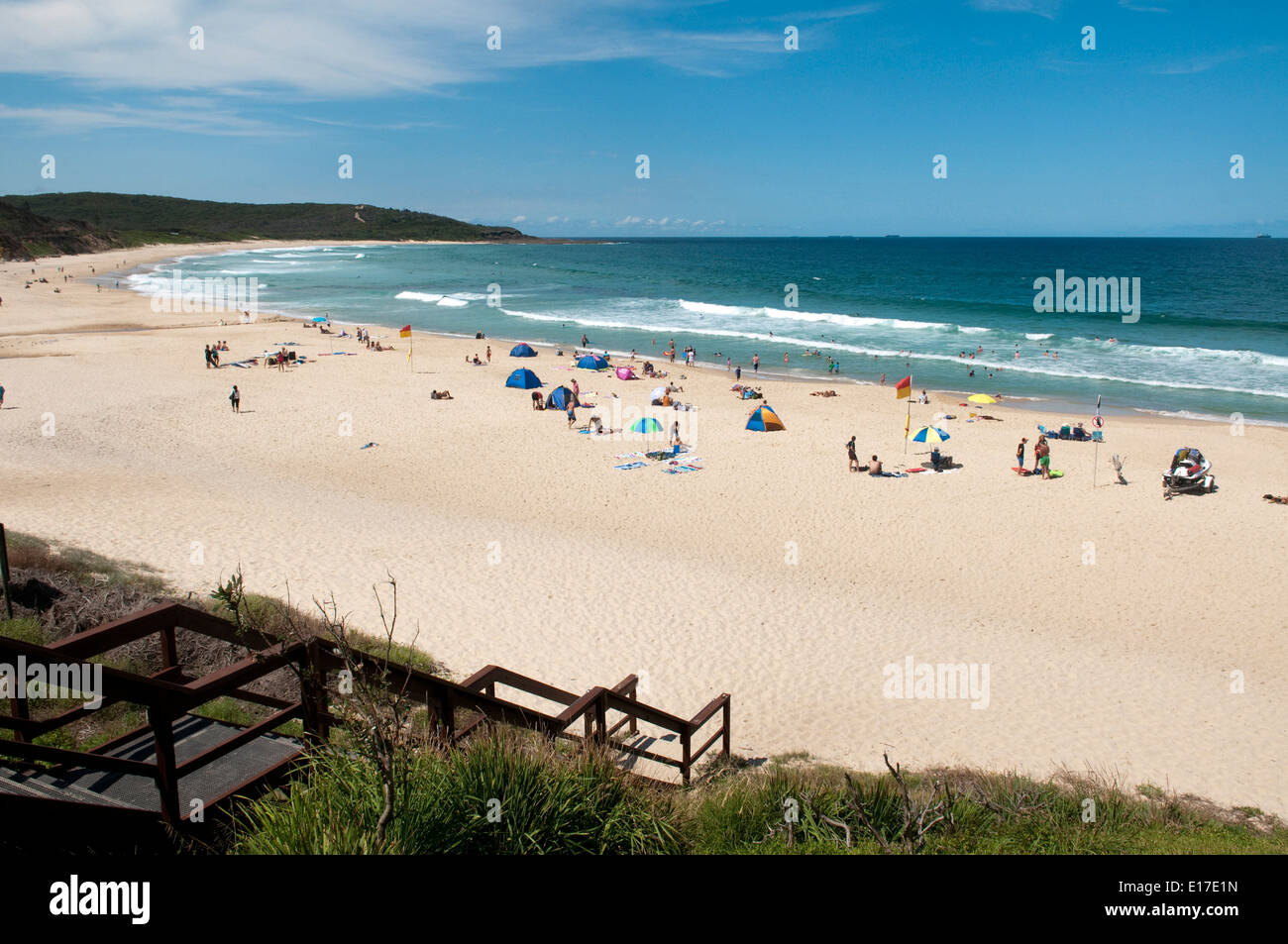 Tourists enjoy the Blue skies and the white sandy beach of Catherine ...