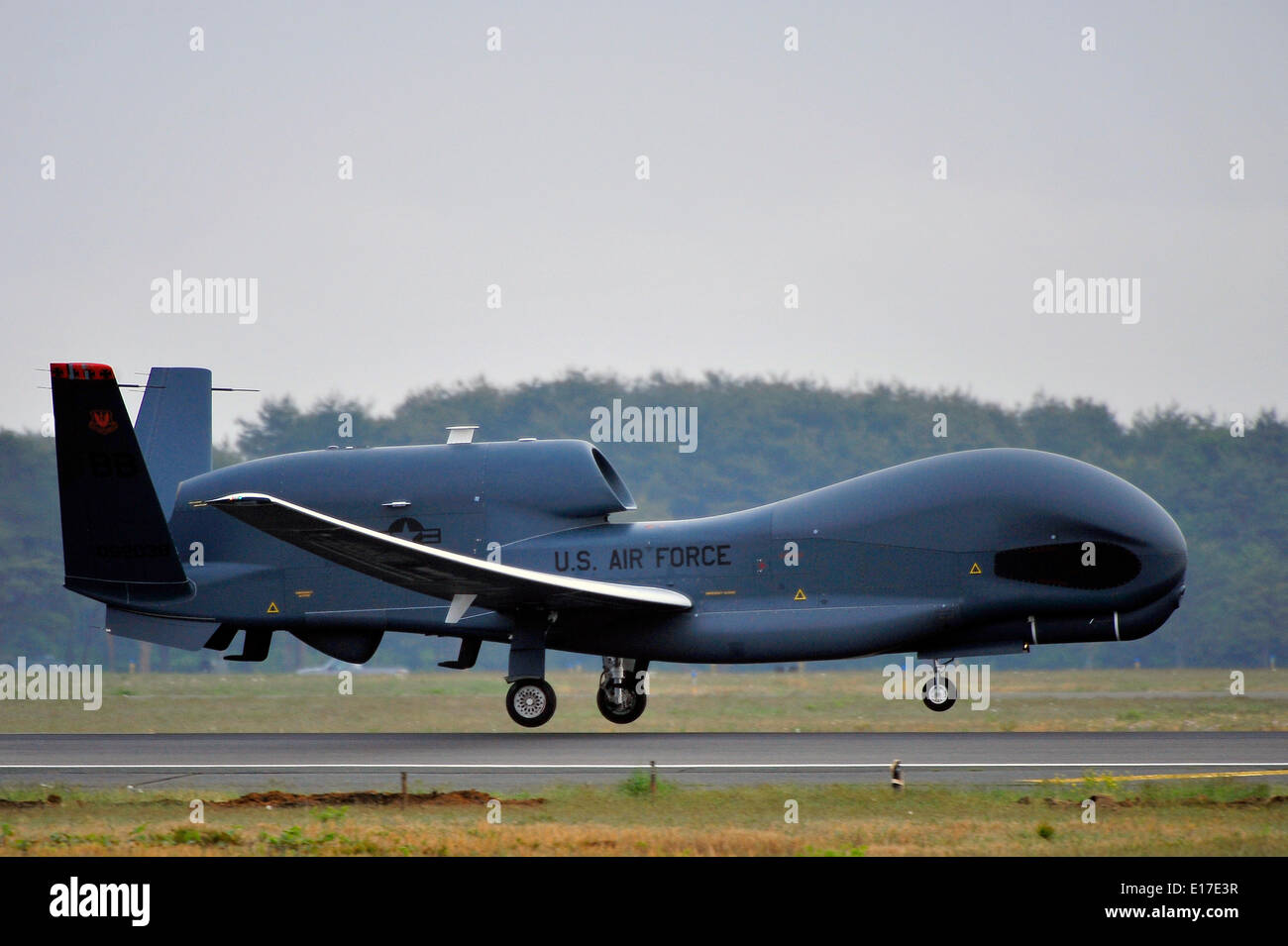 A US Air Force RQ-4 Global Hawk unmanned aerial drone lands for the ...