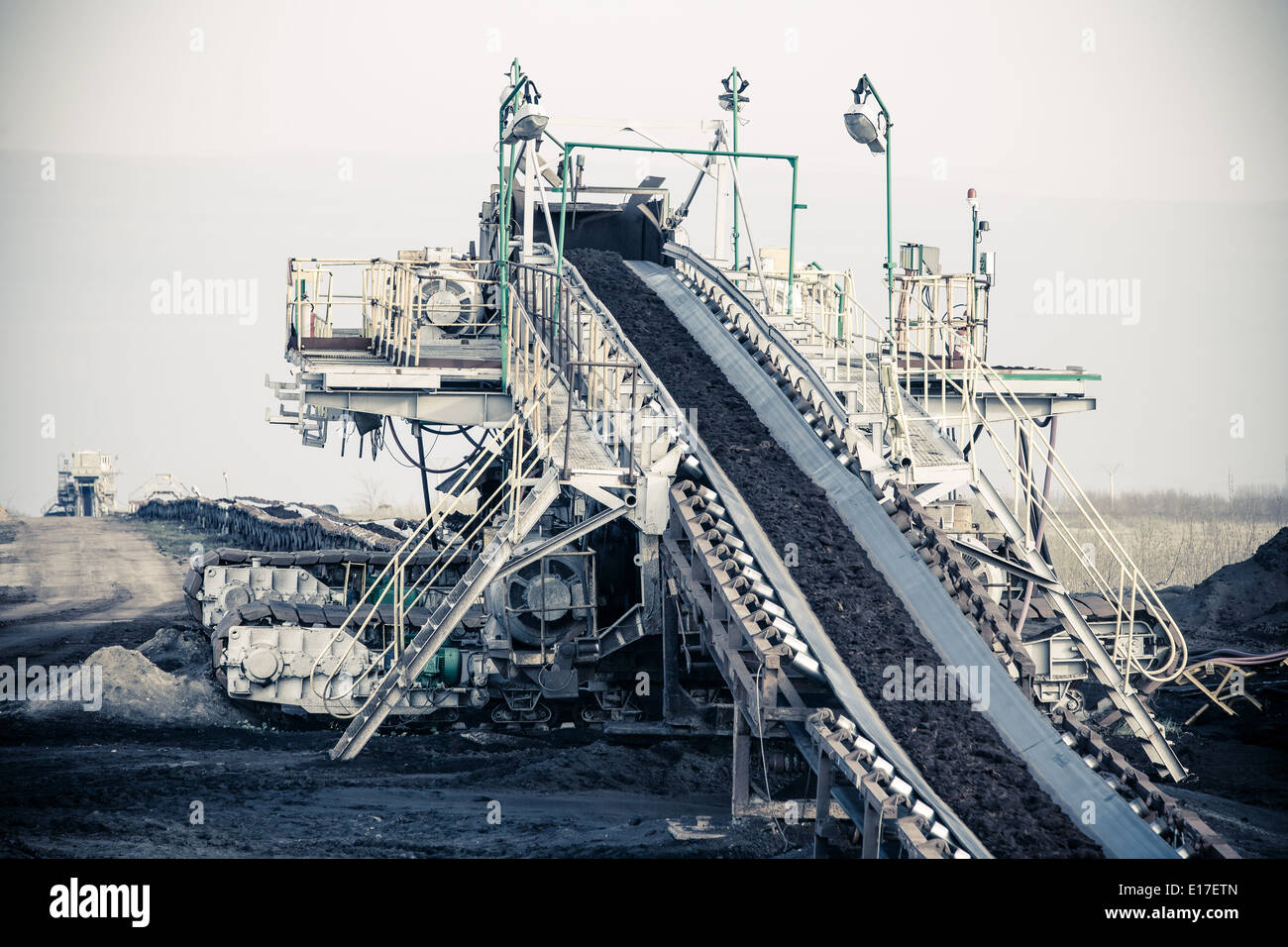 Open pit. Opencast brown coal mine. Belt conveyor as industrial detail ...