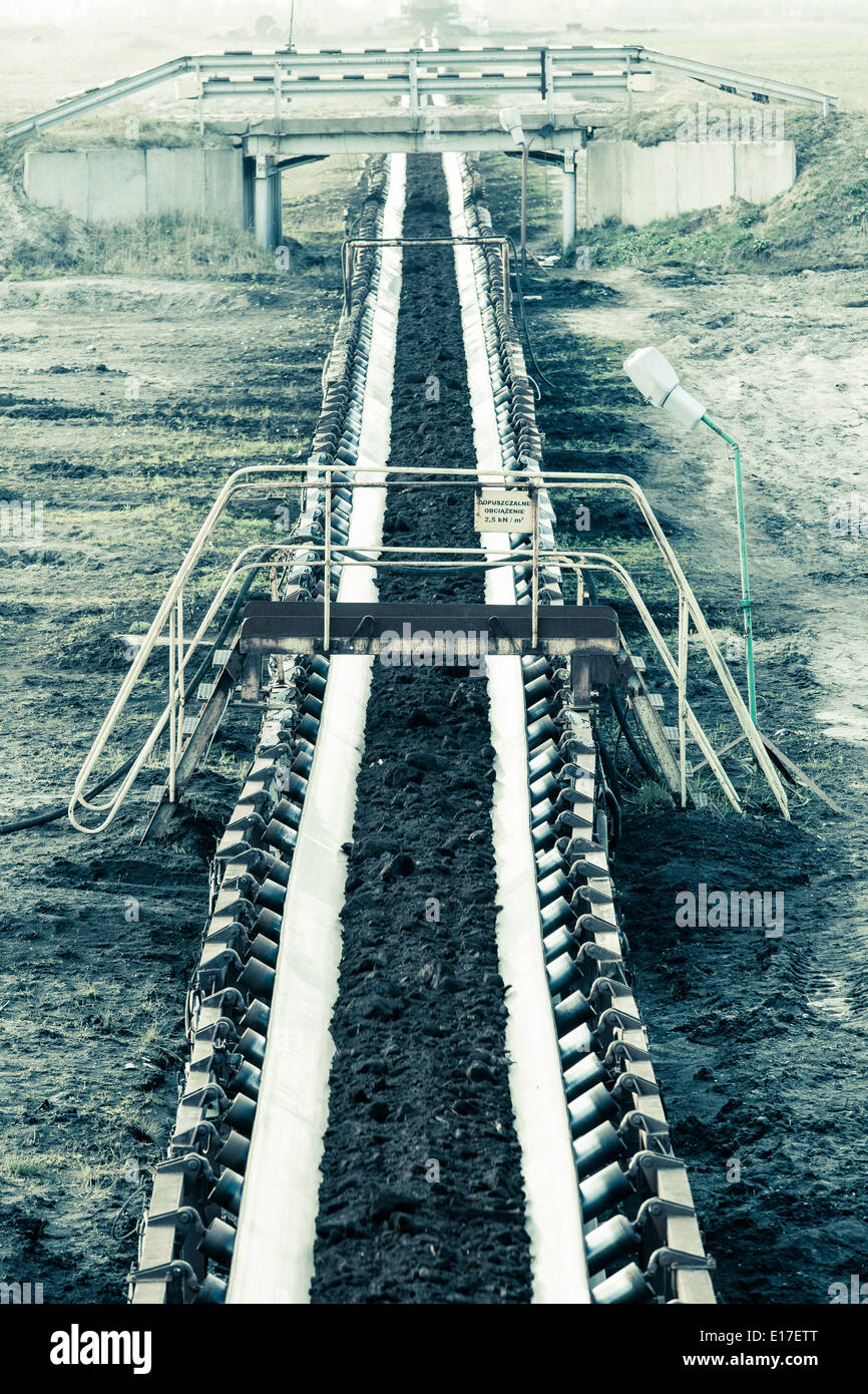 Open pit. Opencast brown coal mine. Belt conveyor as industrial detail ...