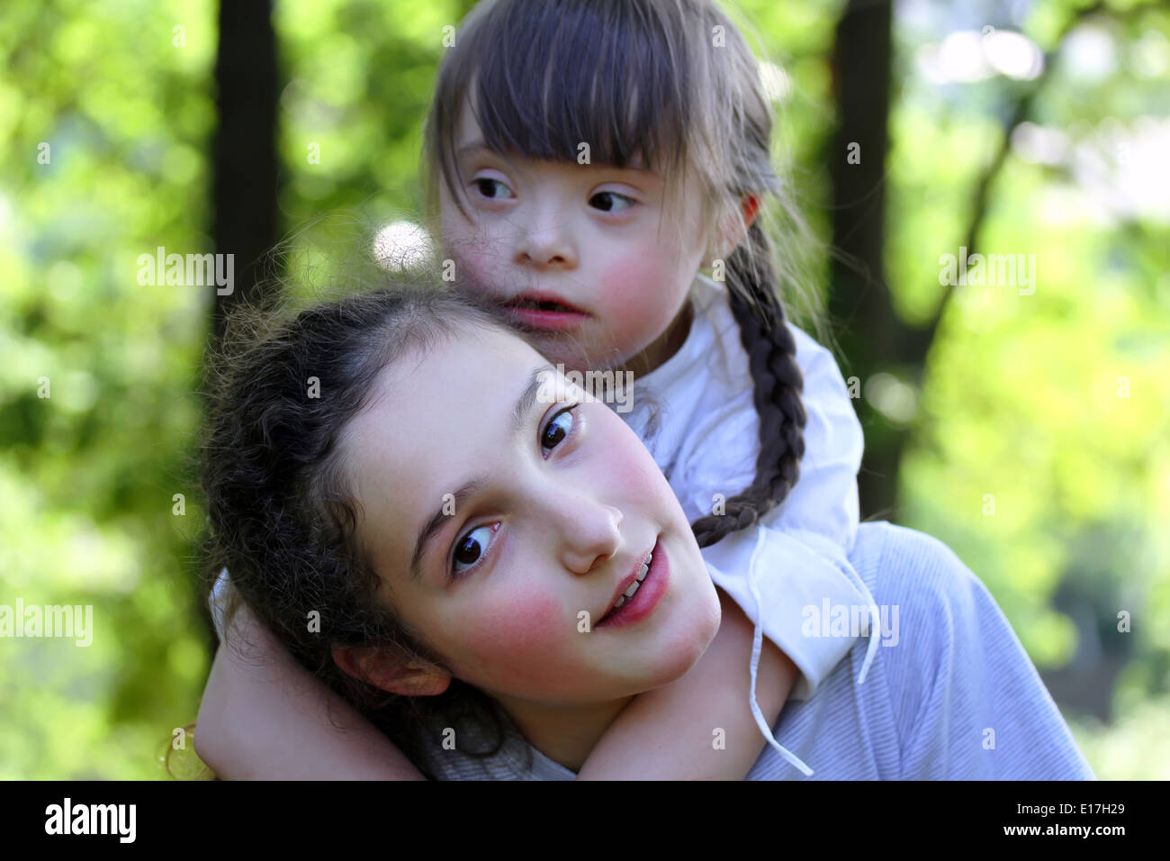 Happy family moments sisters have fun hi-res stock photography and ...