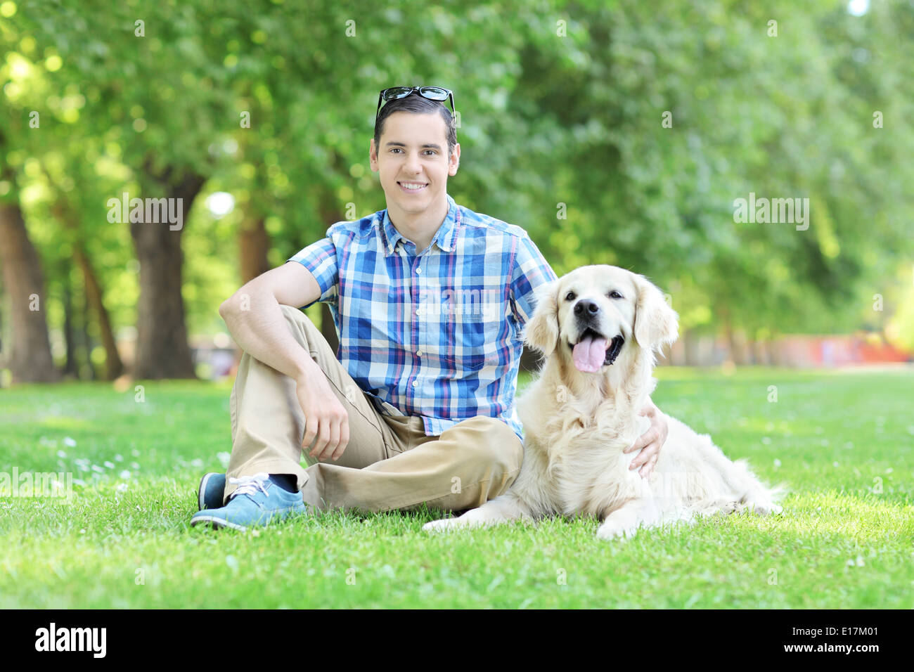 Person relaxing with dog hi-res stock photography and images - Alamy