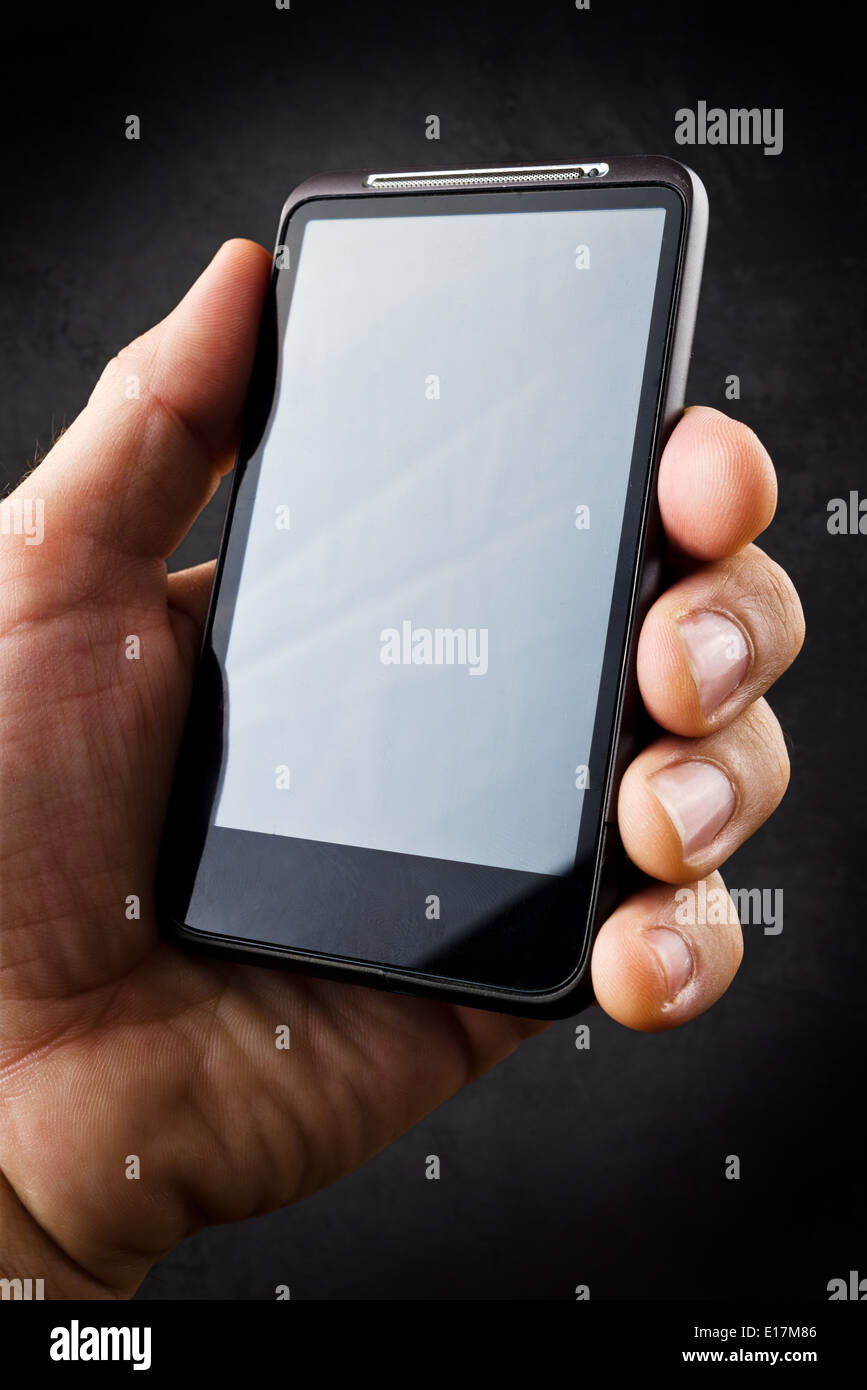 Male Hand with mobile smart phone. New technology concept for e-mails ...