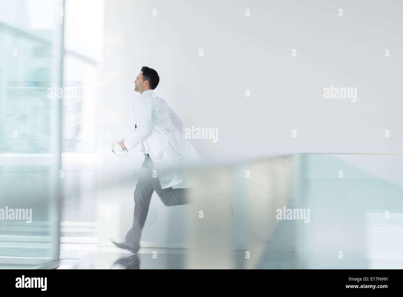 Doctor running in hospital Stock Photo - Alamy