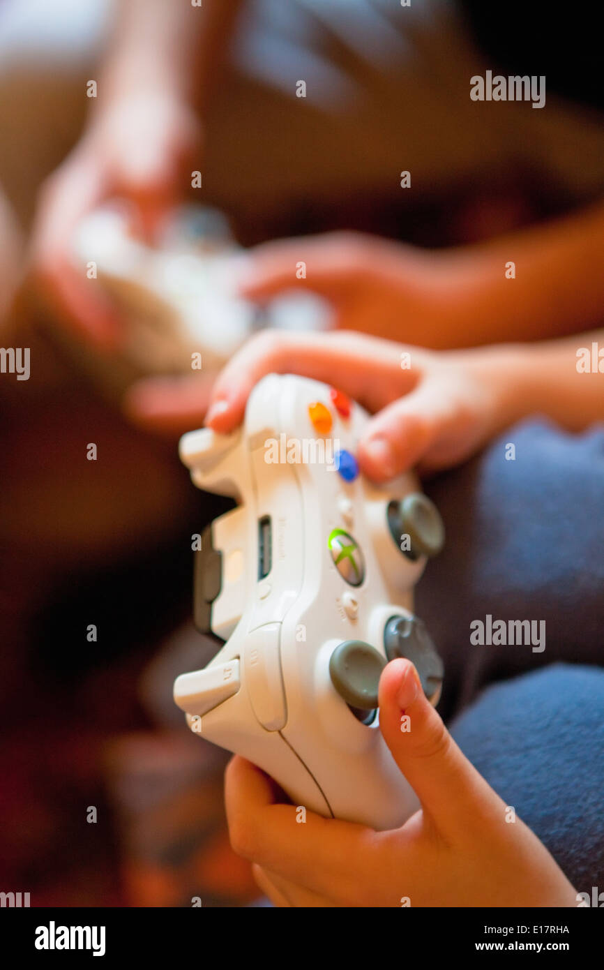 Two boys playing video games hi-res stock photography and images - Alamy