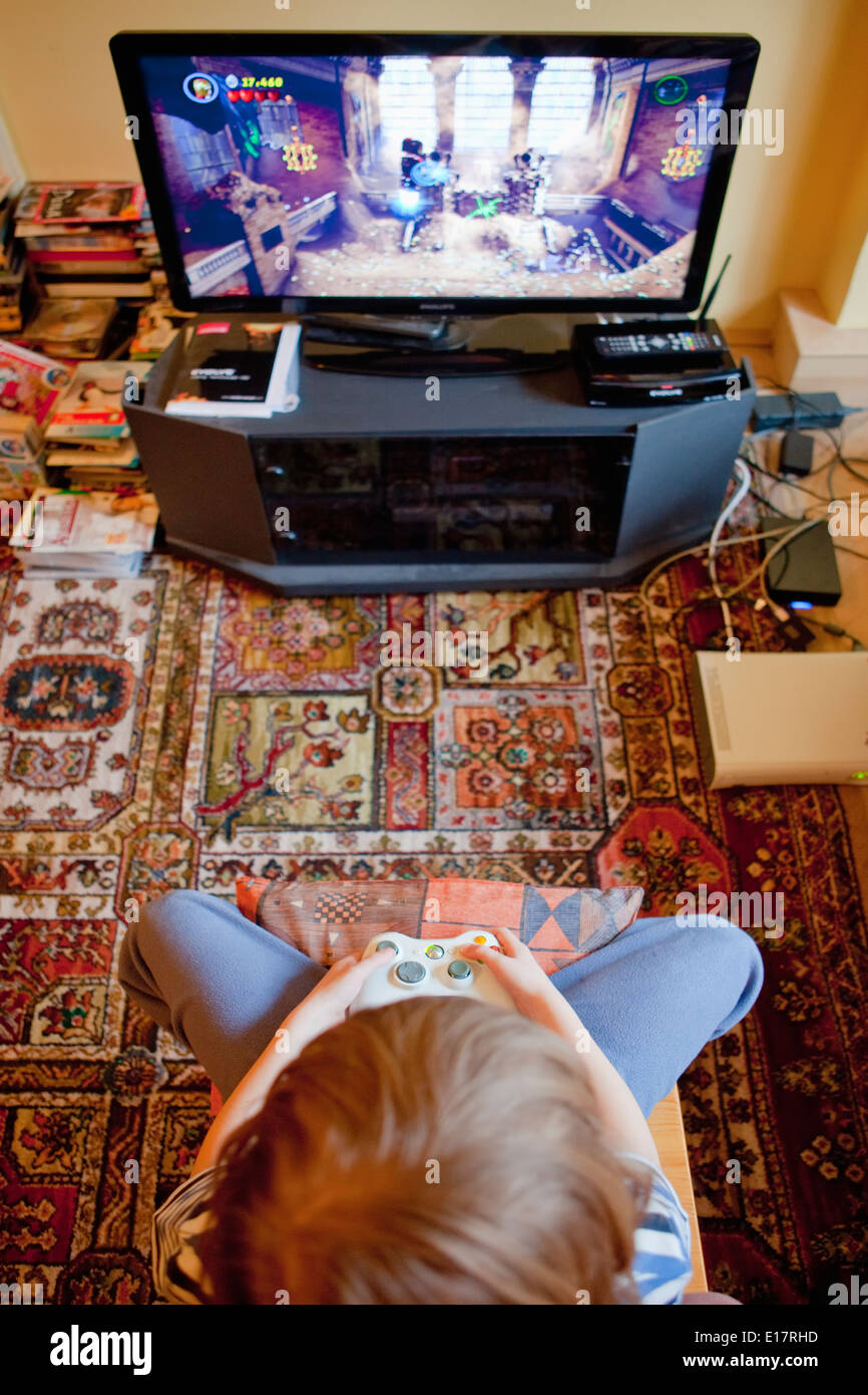 Child hands computer game console hi-res stock photography and images - Alamy