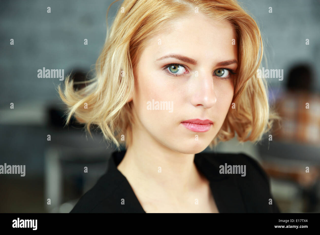 Closeup portrait of a serious young woman Stock Photo - Alamy
