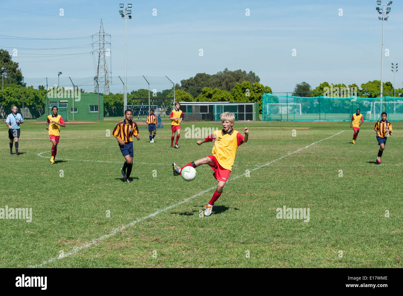 Junior football player controls a ball flying through the air, Cape ...