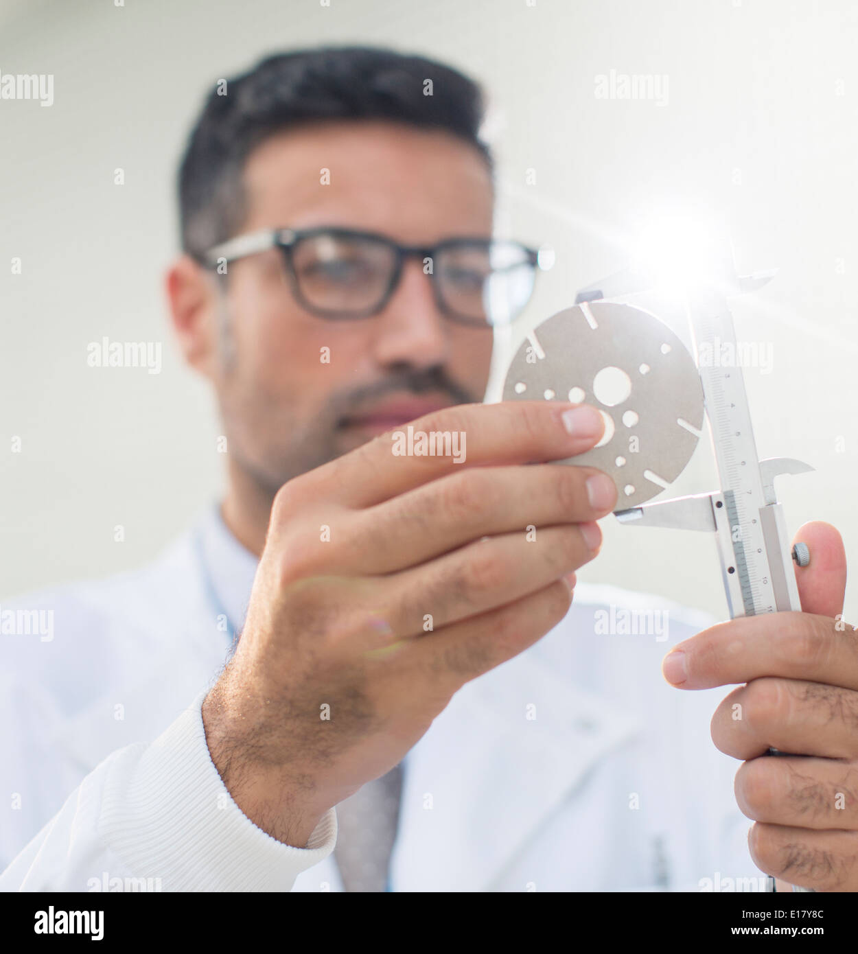 Scientist using caliper Stock Photo - Alamy