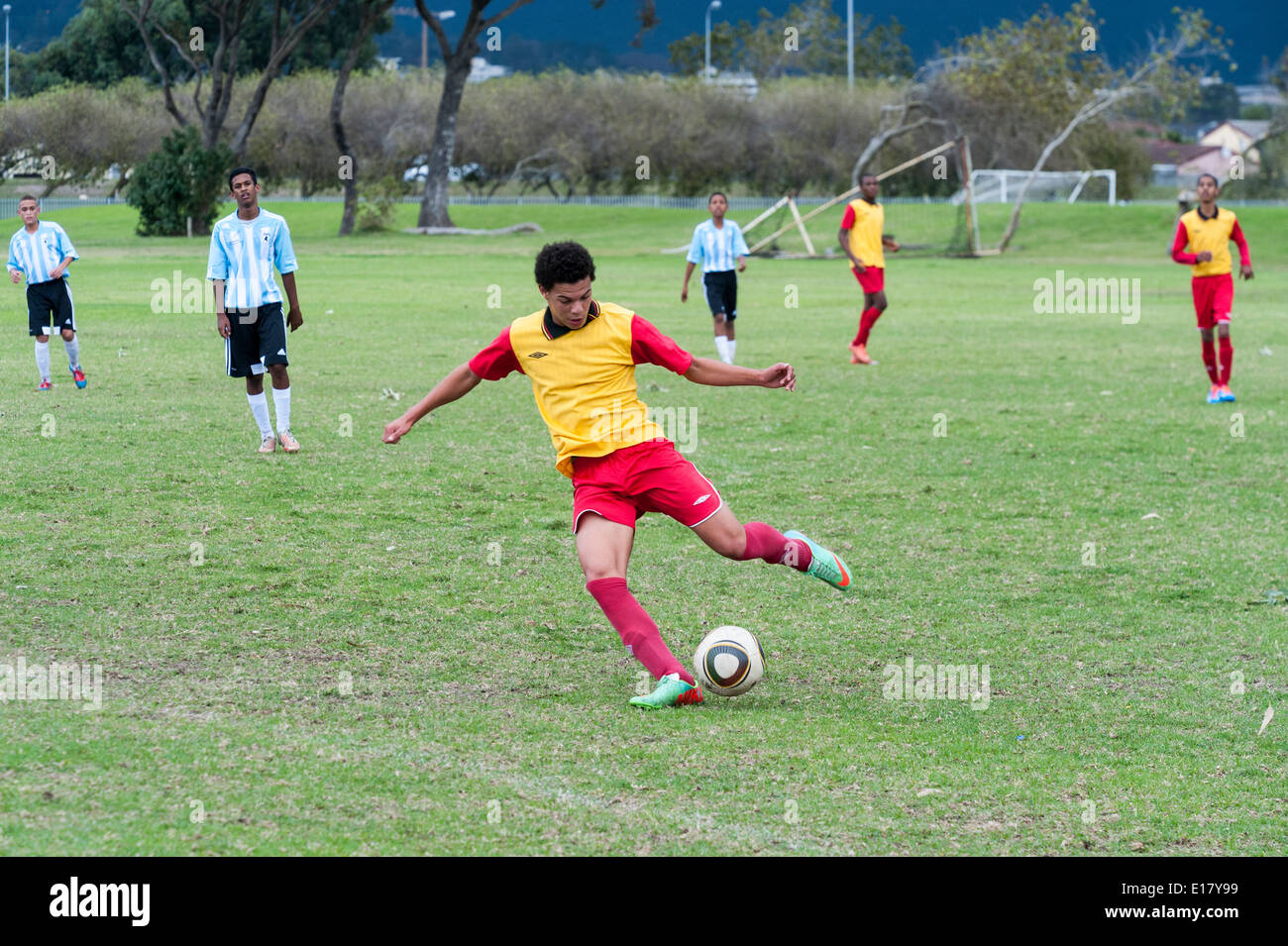 Football player kicking ball hi-res stock photography and images - Alamy