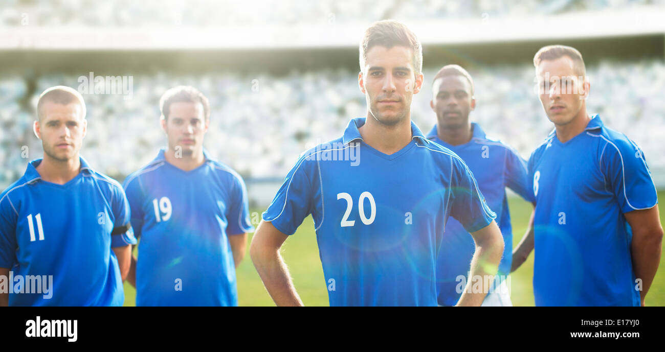 Young team standing on hi-res stock photography and images - Alamy