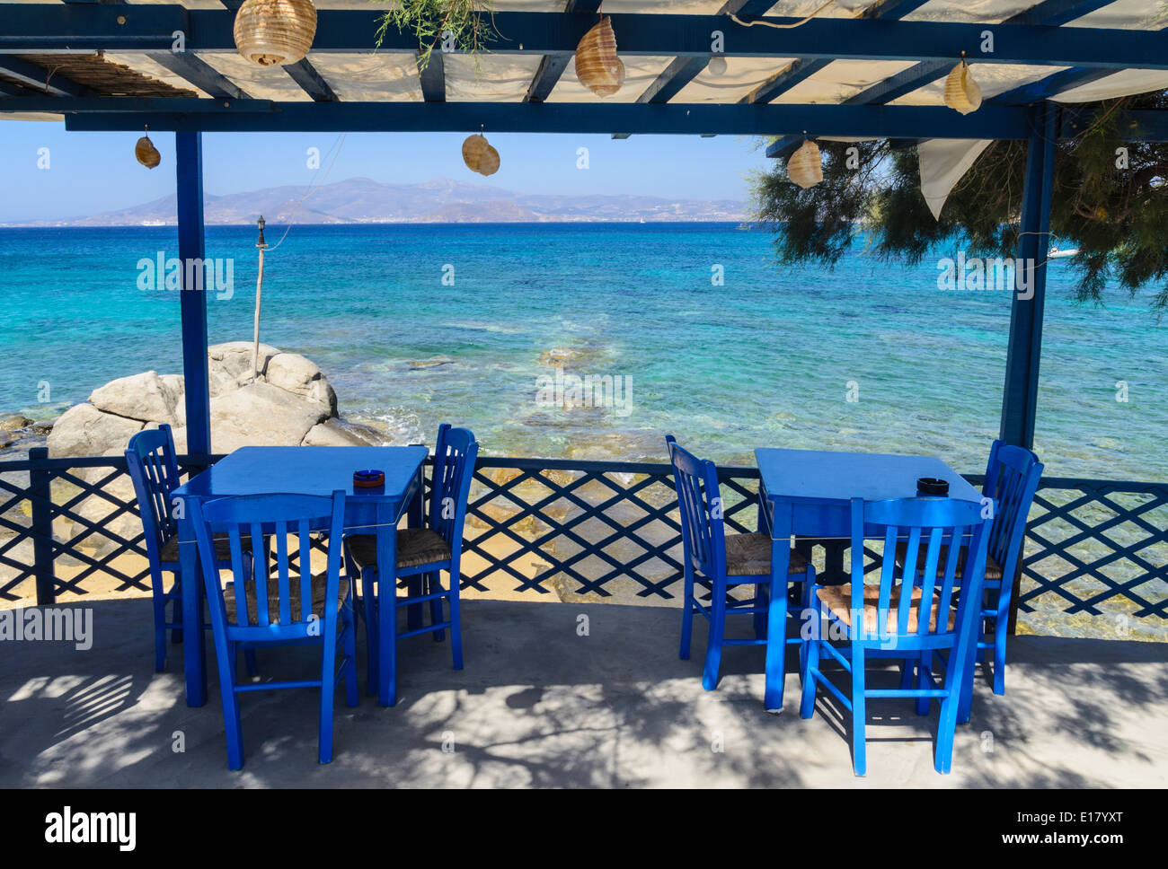 Restaurant tables overlooking mediterranean sea hi-res stock ...