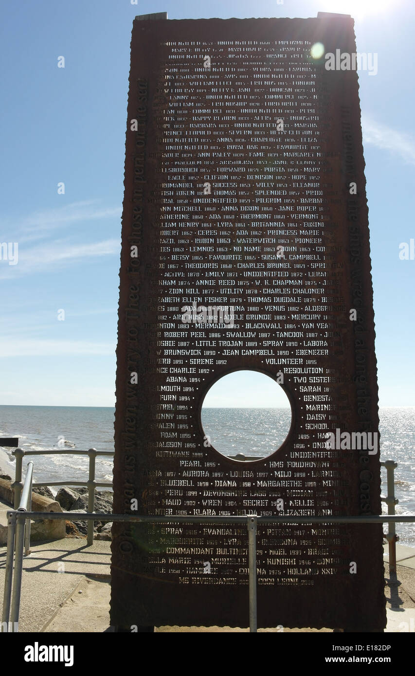 Blue sky portrait, looking south, metal Shipwreck Memorial surrounded ...