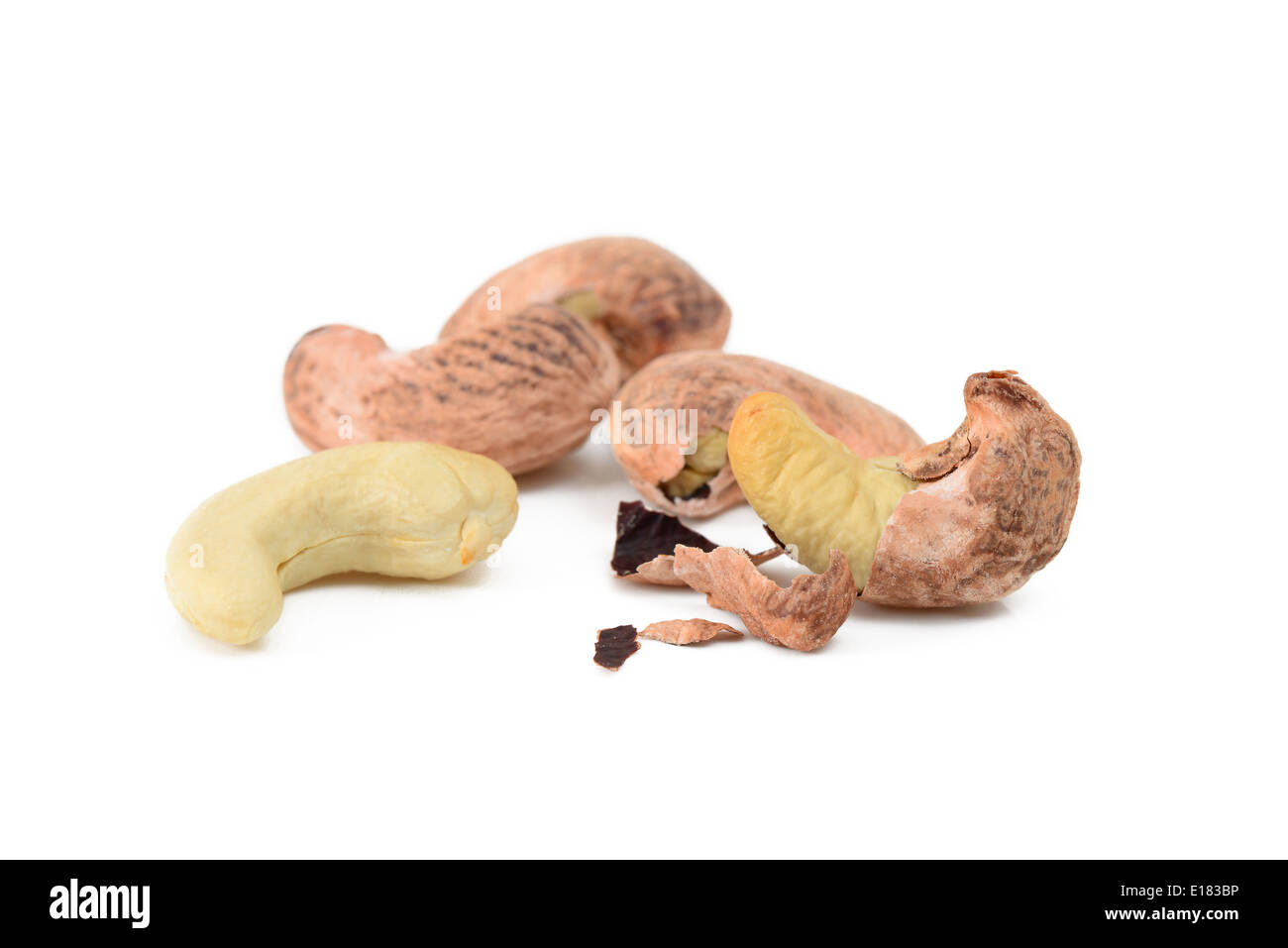 cashews with shell isolated on white Stock Photo - Alamy
