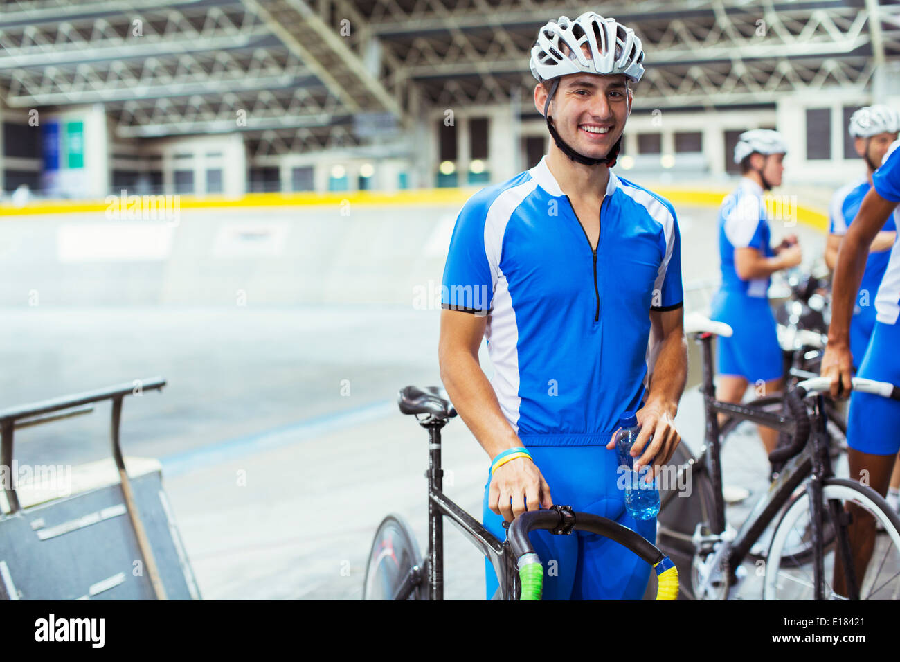 Portrait of track cyclist in velodrome Stock Photo - Alamy