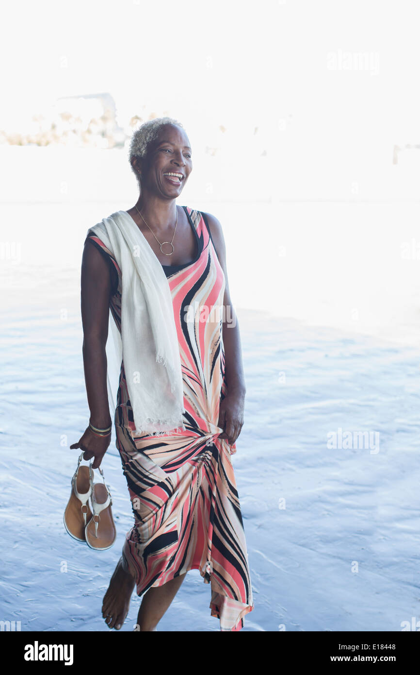Woman in dress wading in water hi-res stock photography and images - Alamy