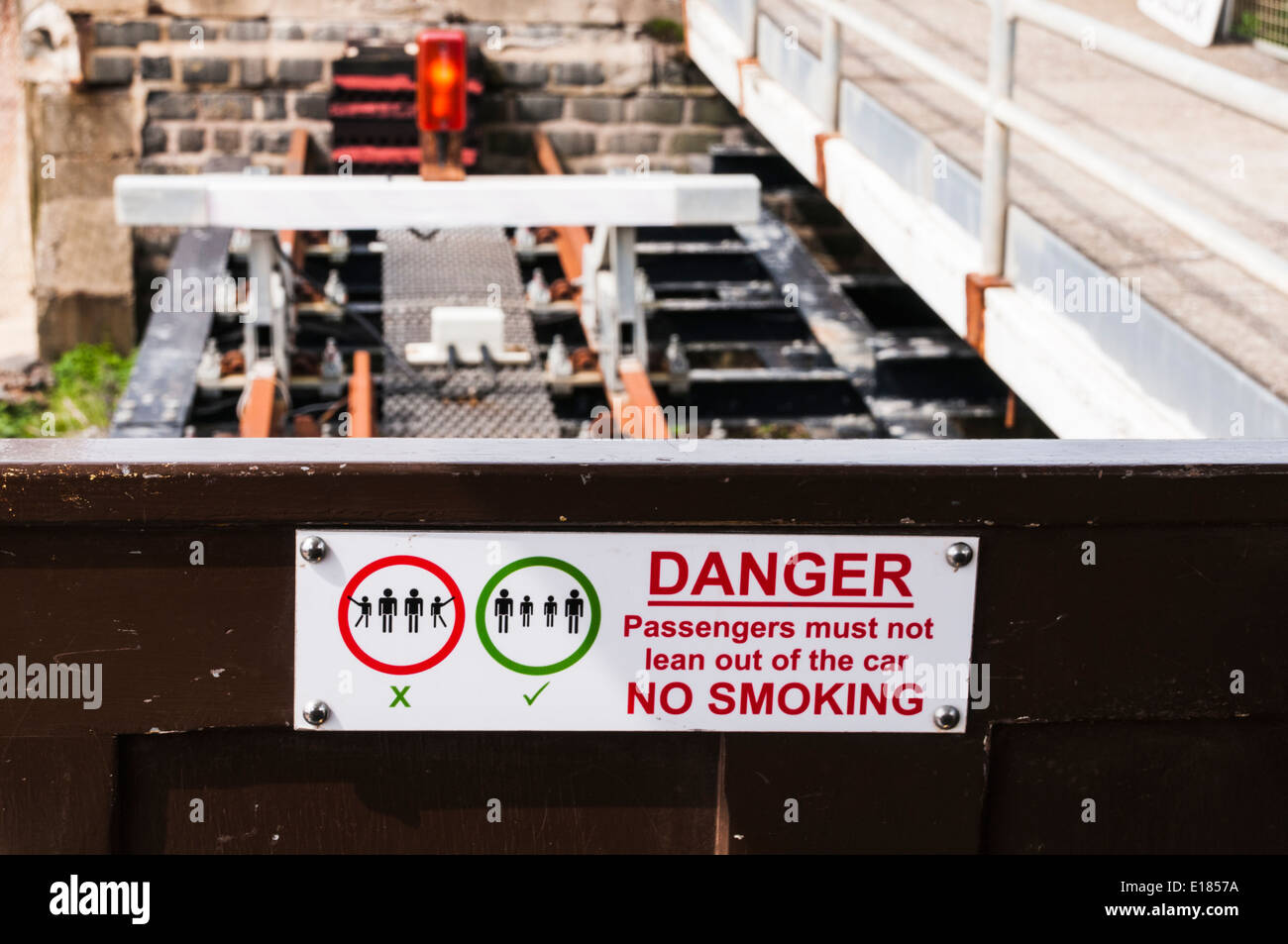 Warning sign inside the carriage of a Volks Railway narrow gauge train ...