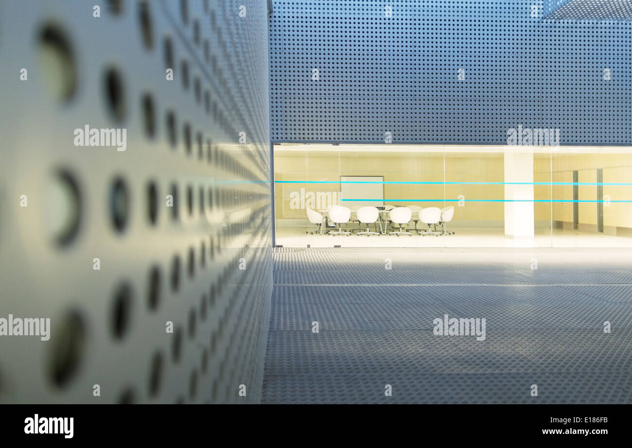 Illuminated conference room in modern building at night Stock Photo - Alamy