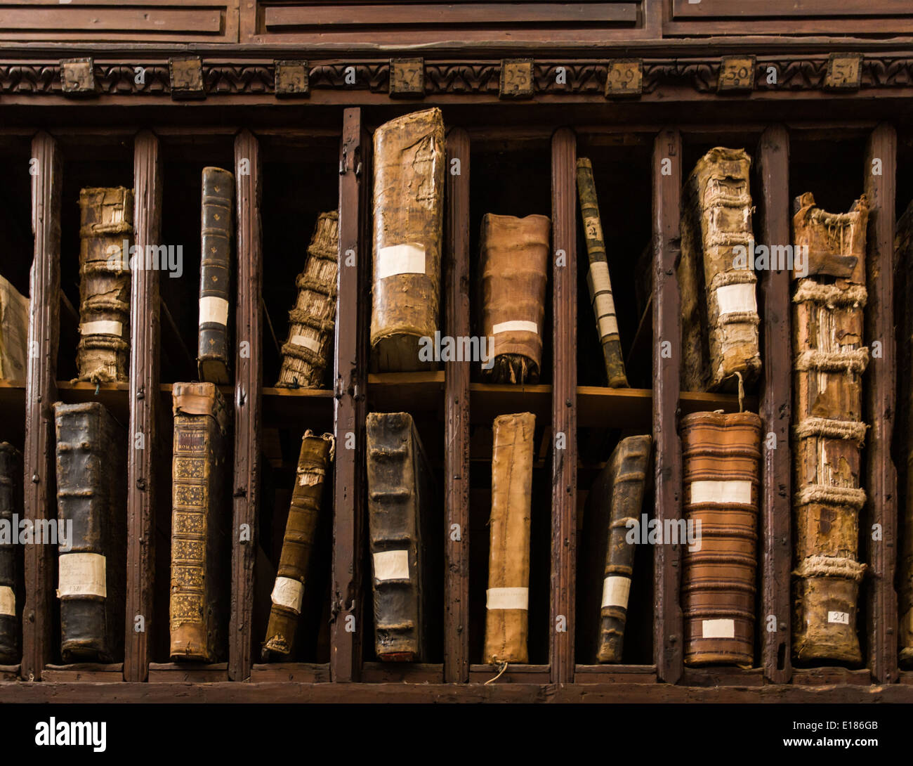 Old books on shelf Stock Photo - Alamy