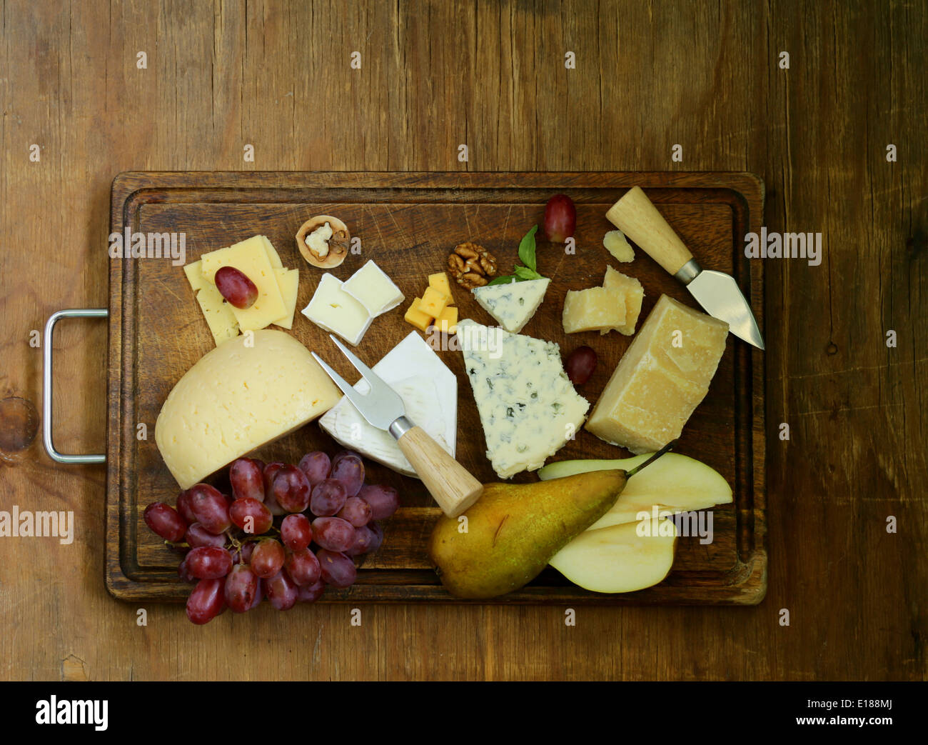 cheeseboard with assorted cheeses (parmesan, brie, blue, cheddar Stock ...