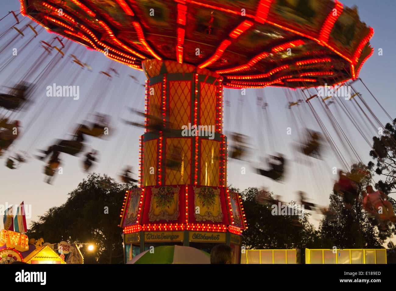 Spinning carnival ride hi-res stock photography and images - Alamy