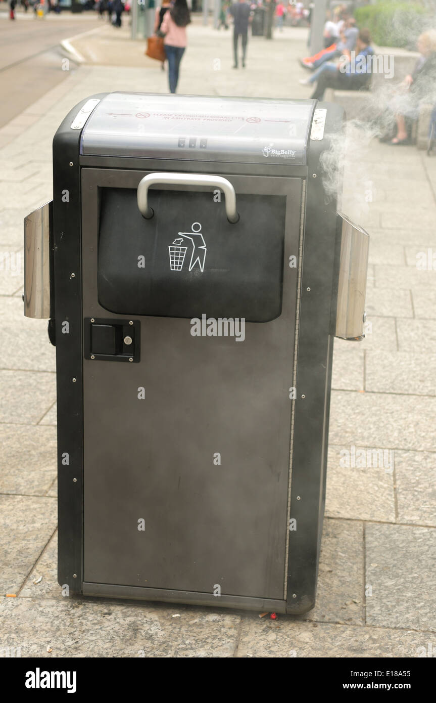 Cigarette Smoke Come From Big Belly Bin Stock Photo - Alamy