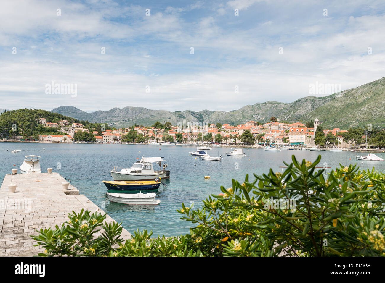 The Waterfront, Cavtat, with a boats moored across the bay, Croatia ...