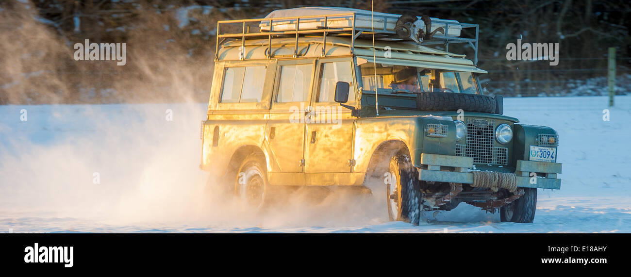 Land Rover Series 2a driving in snow. Fallston, Maryland, USA Stock ...