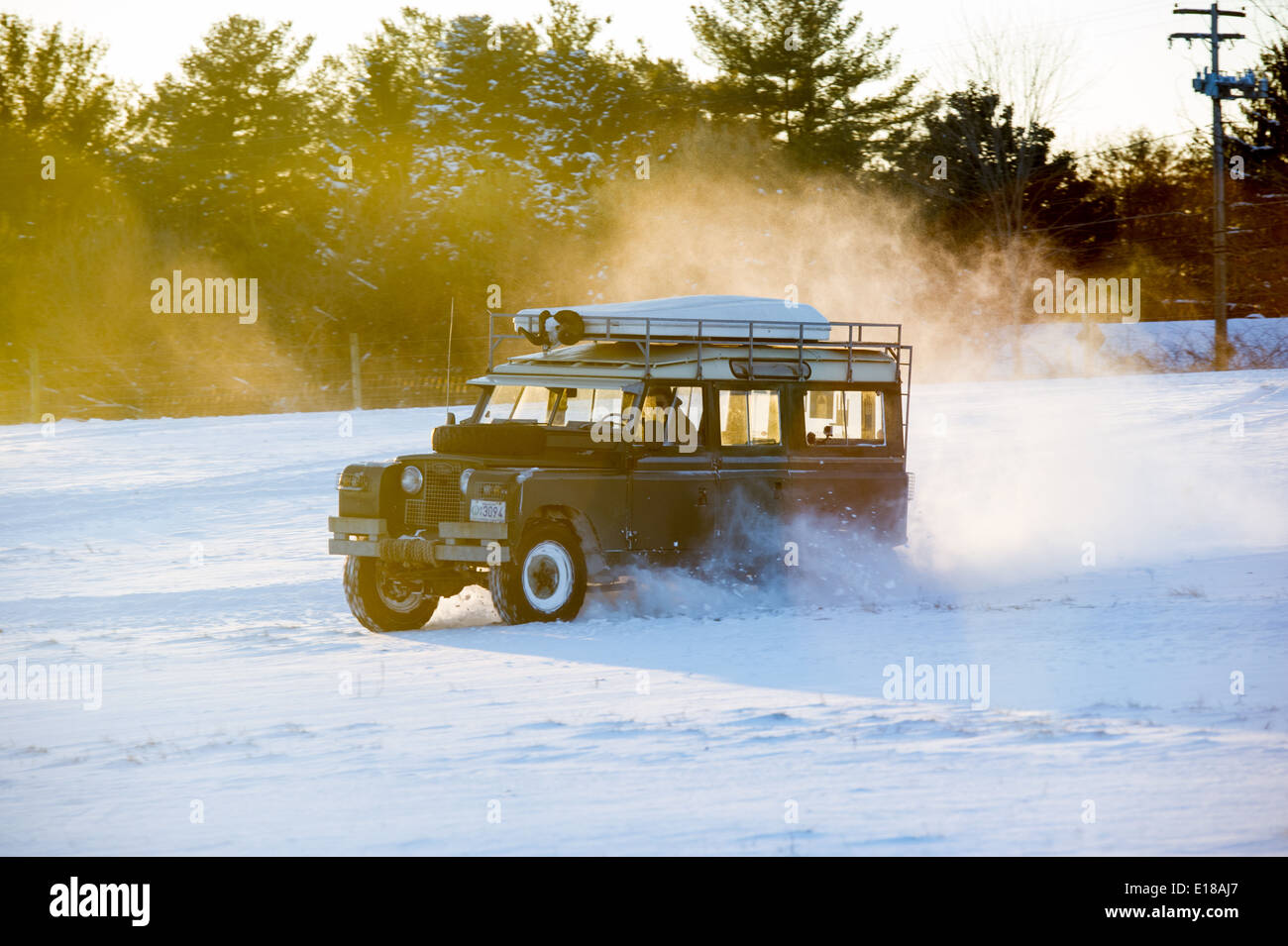 Land Rover Series 2a driving in snow. Fallston, Maryland, USA Stock ...