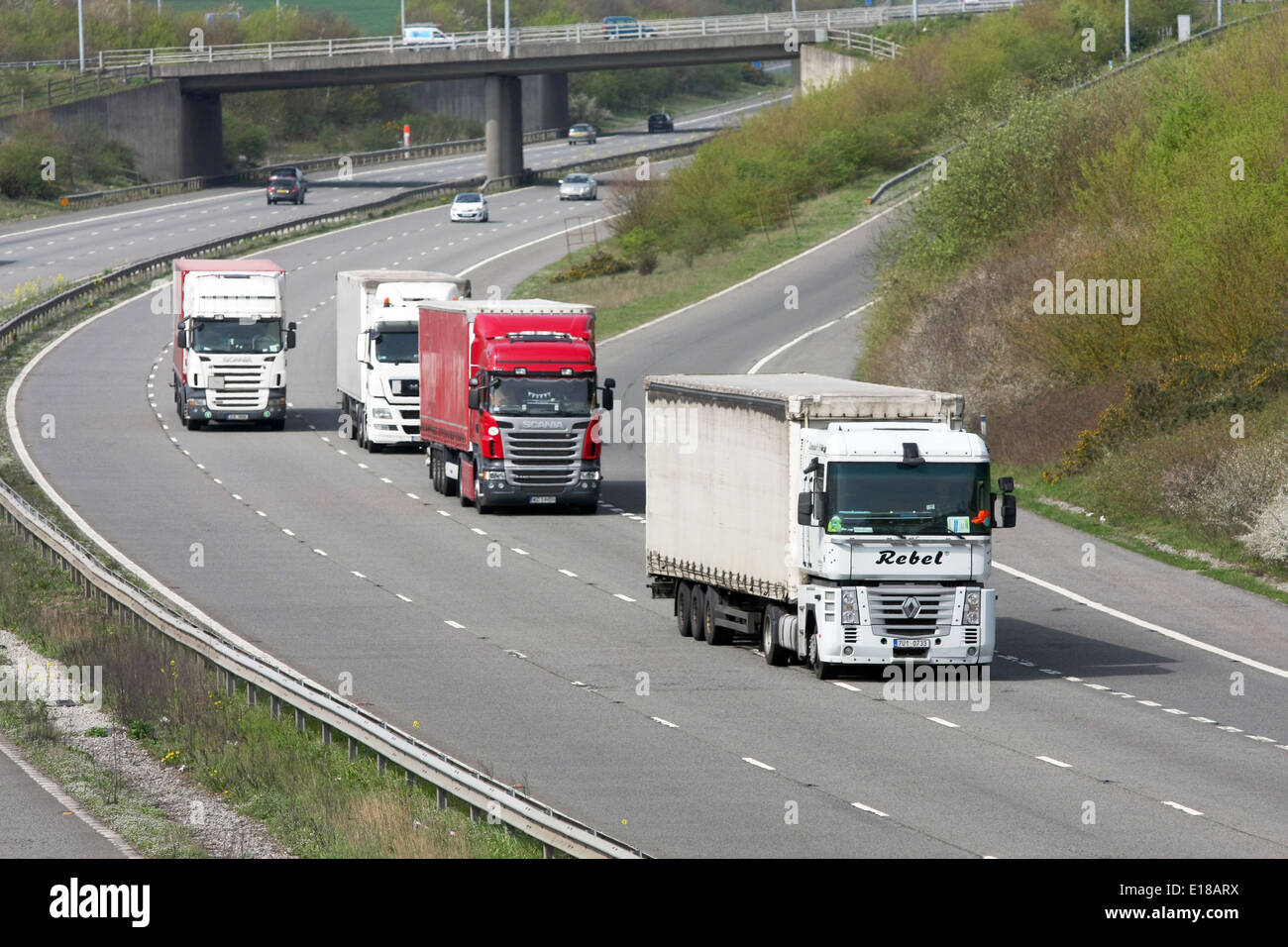 Trucks and cars traveling along the M20 motorway in Kent, England Stock ...