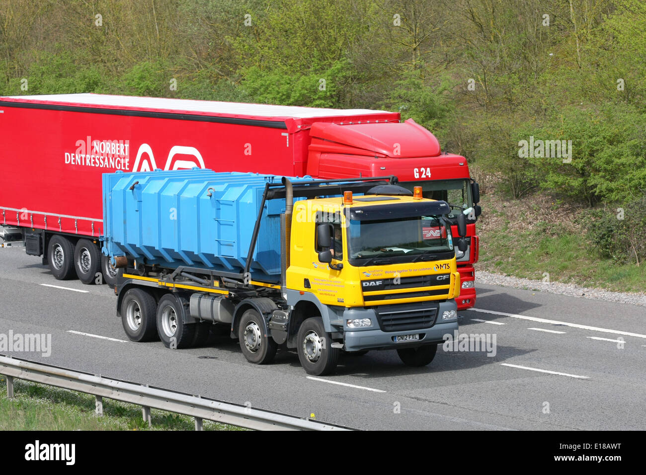 A Southern Water truck overtaking a Norbert Dentressangle truck on the ...