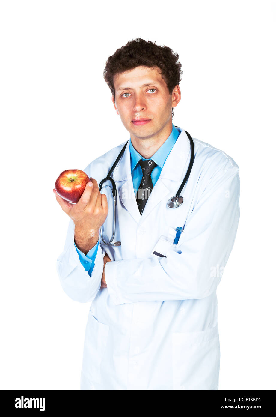 Portrait of a male doctor holding red apple on white background Stock ...
