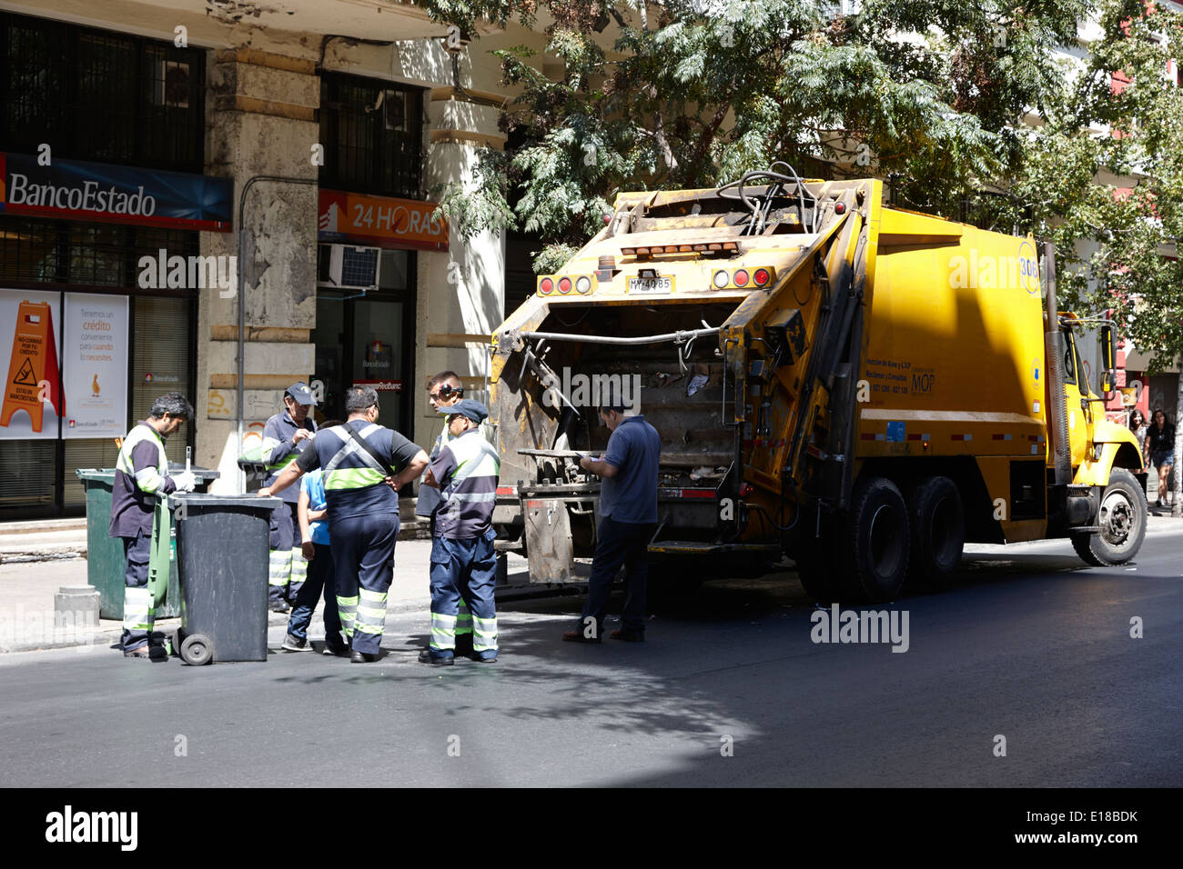 city workers with waste refuse lorry in downtown Santiago Chile Stock ...