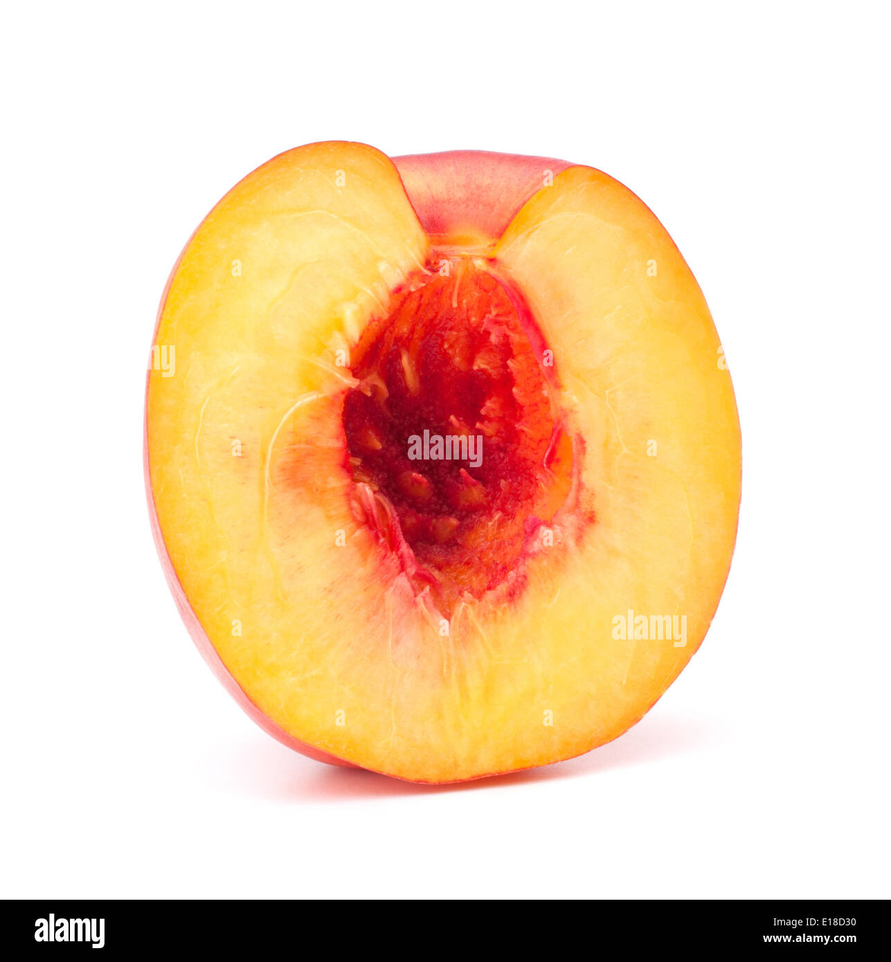 Nectarine fruit half isolated on white background cutout Stock Photo ...