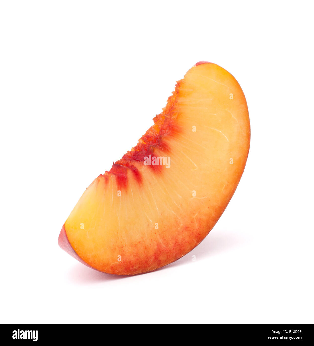 Nectarine fruit segment isolated on white background cutout Stock Photo - Alamy