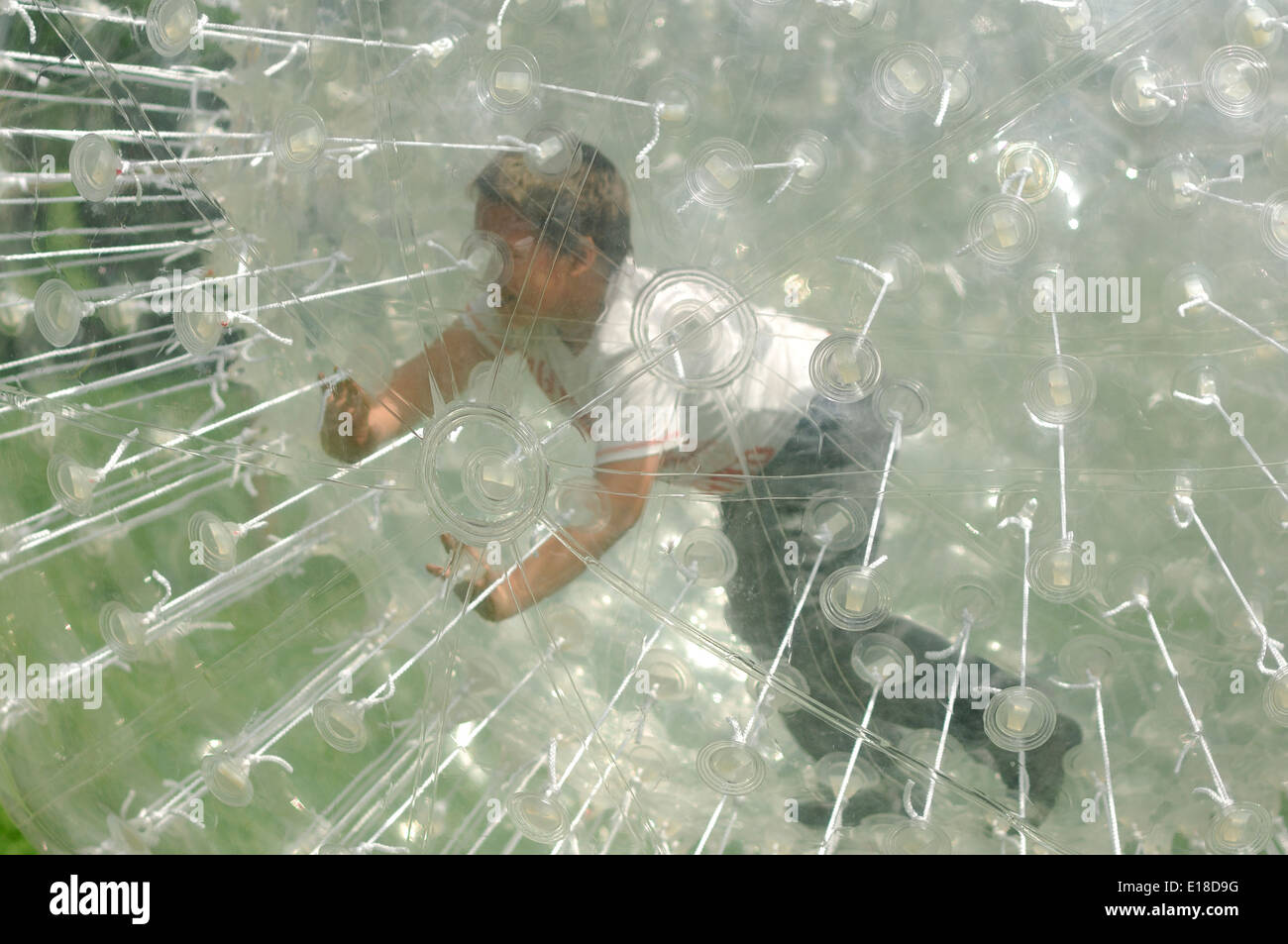 child playing inside an inflatable ball Stock Photo - Alamy