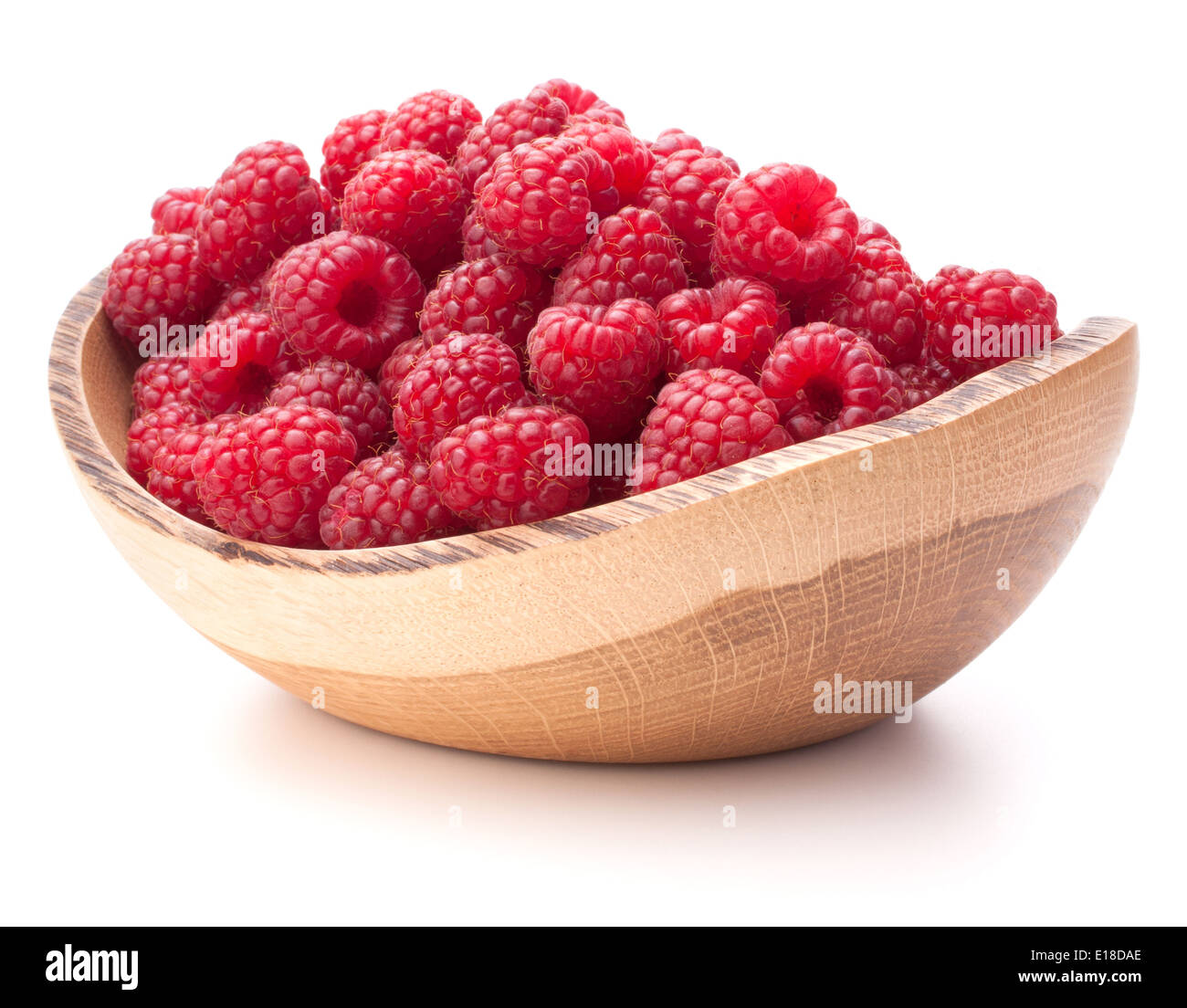 raspberries in wooden bowl isolated on white background cutout Stock ...