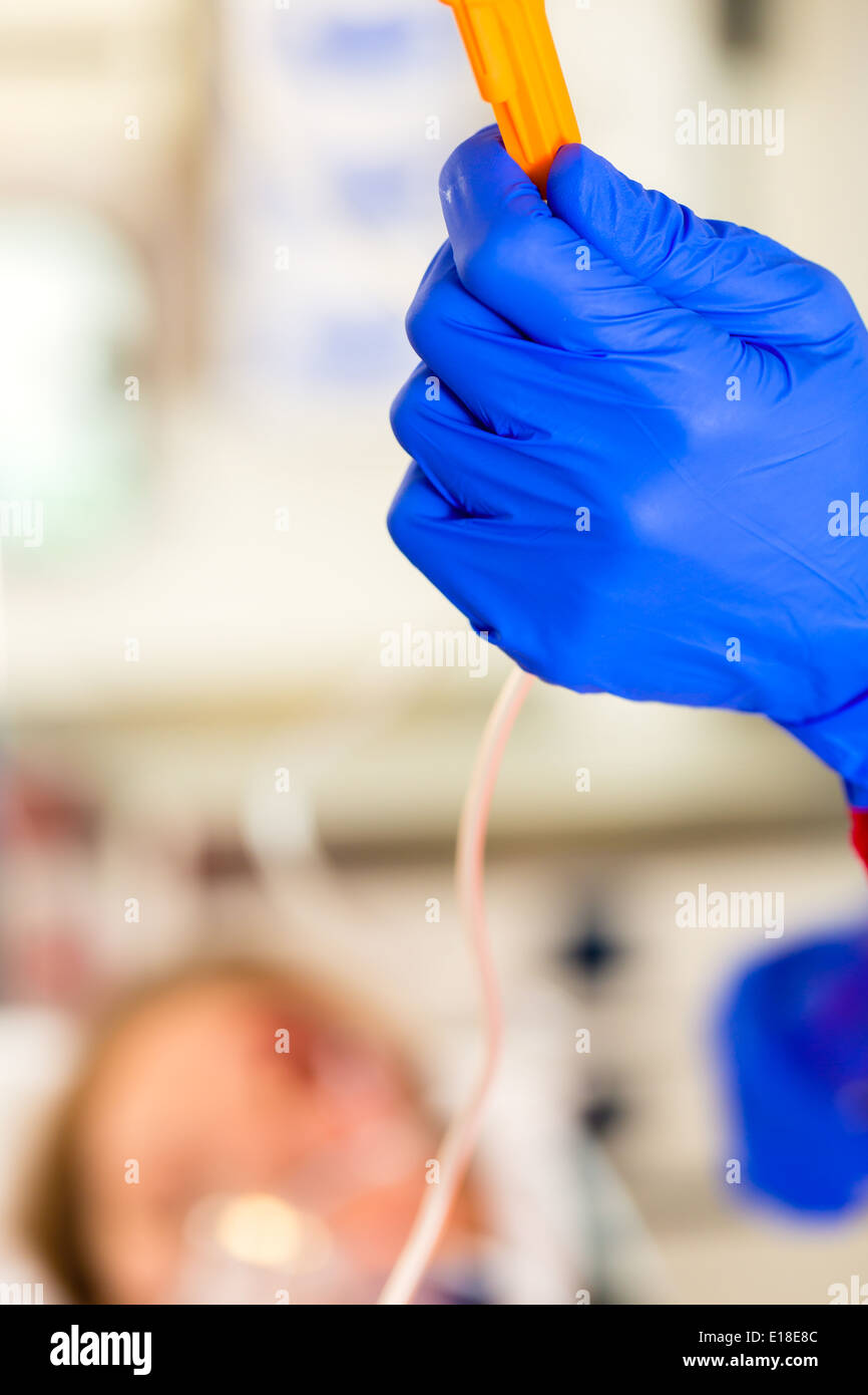 Ambulance Emergency doctor or paramedic medicate accident victim with ...