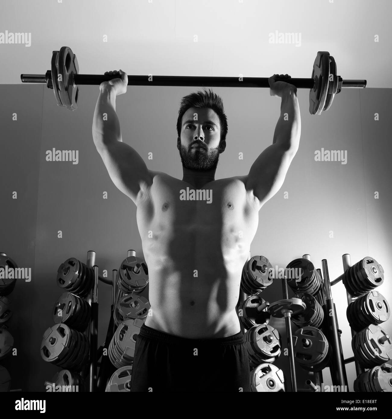 Barbell beard man workout fitness at weightlifting gym Stock Photo - Alamy