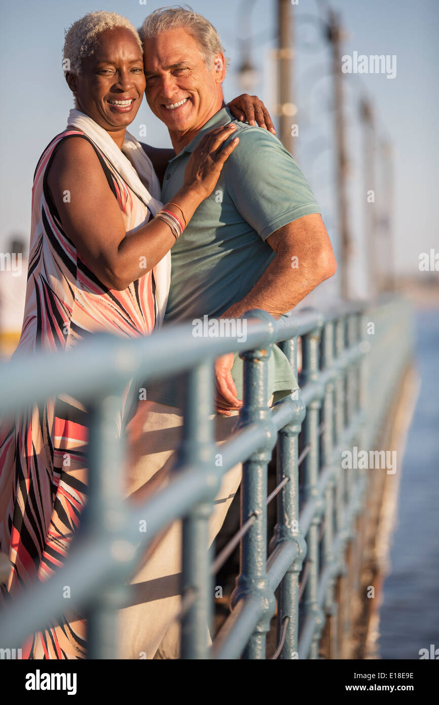 Mature woman senior man hugging hi-res stock photography and images - Alamy