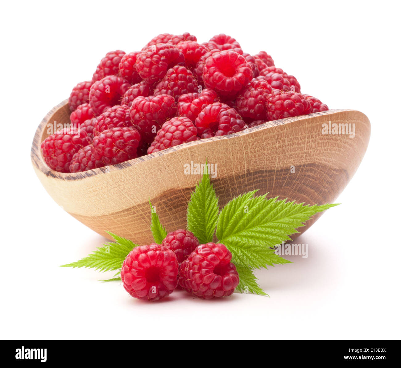 raspberries in wooden bowl isolated on white background cutout Stock ...