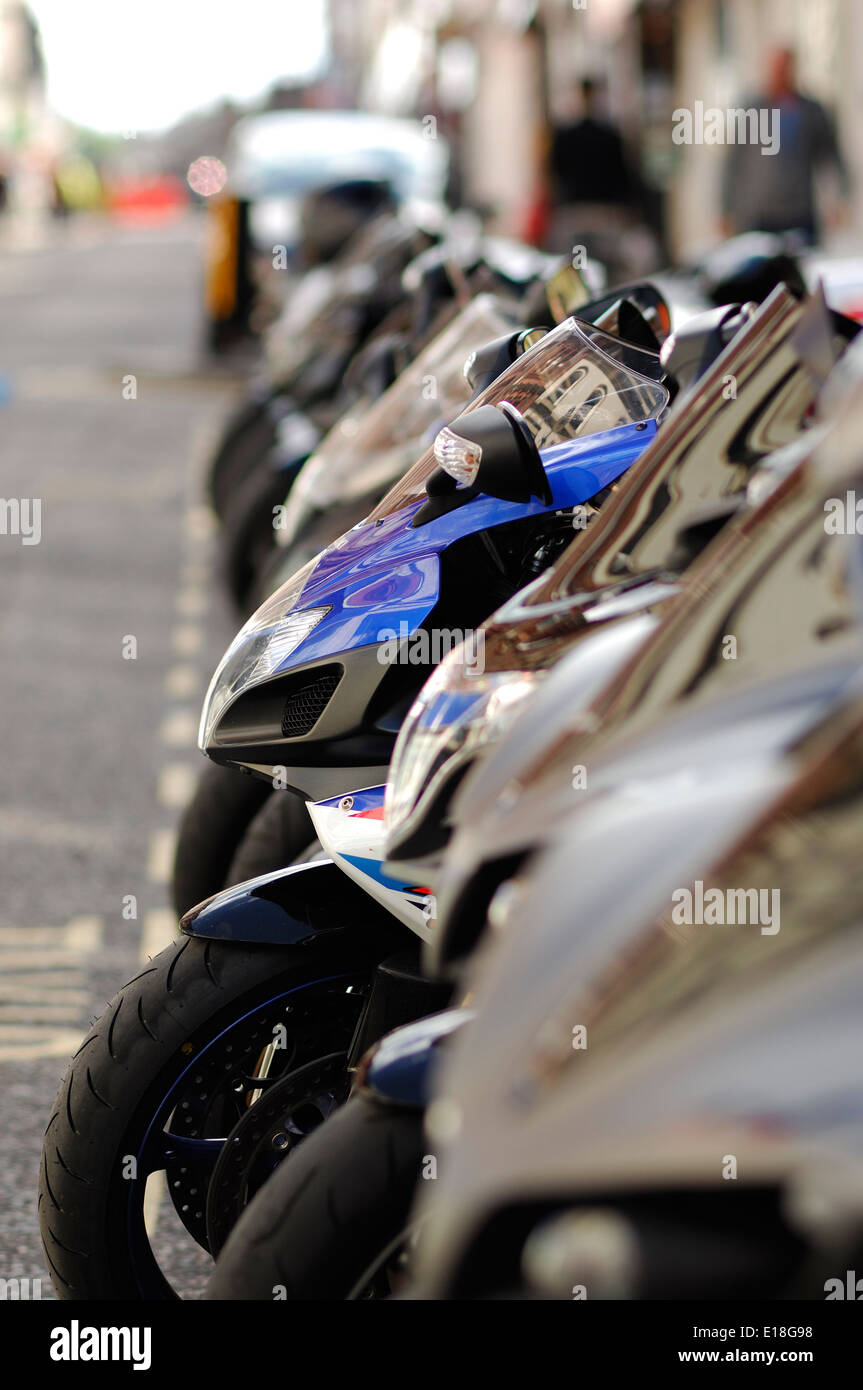 motorbikes parked in a row Stock Photo - Alamy