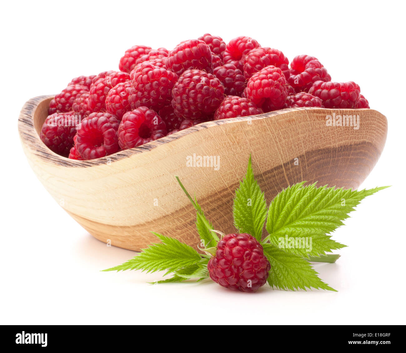 raspberries in wooden bowl isolated on white background cutout Stock ...
