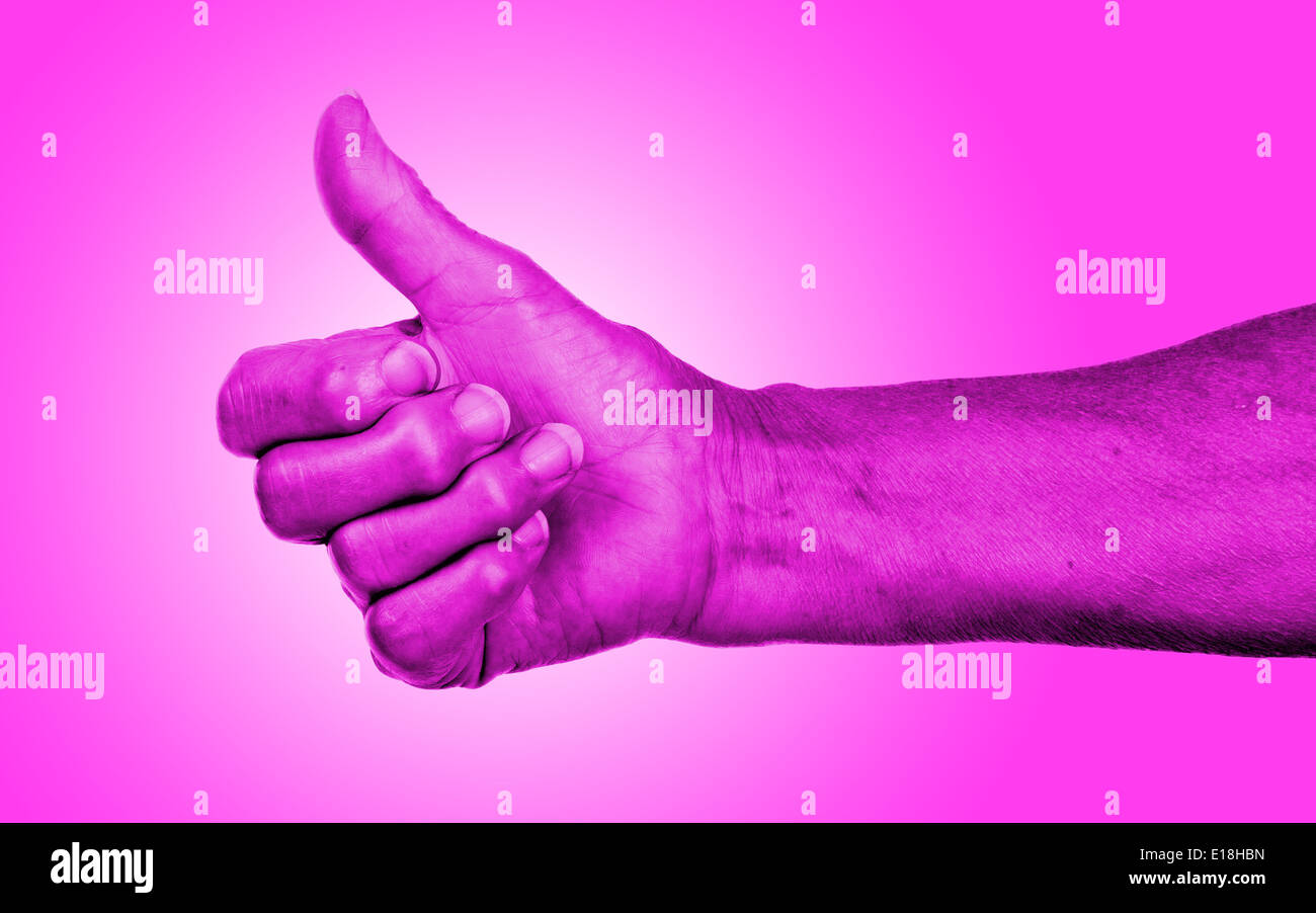 Old woman with arthritis giving the thumbs up sign, pink skin Stock ...