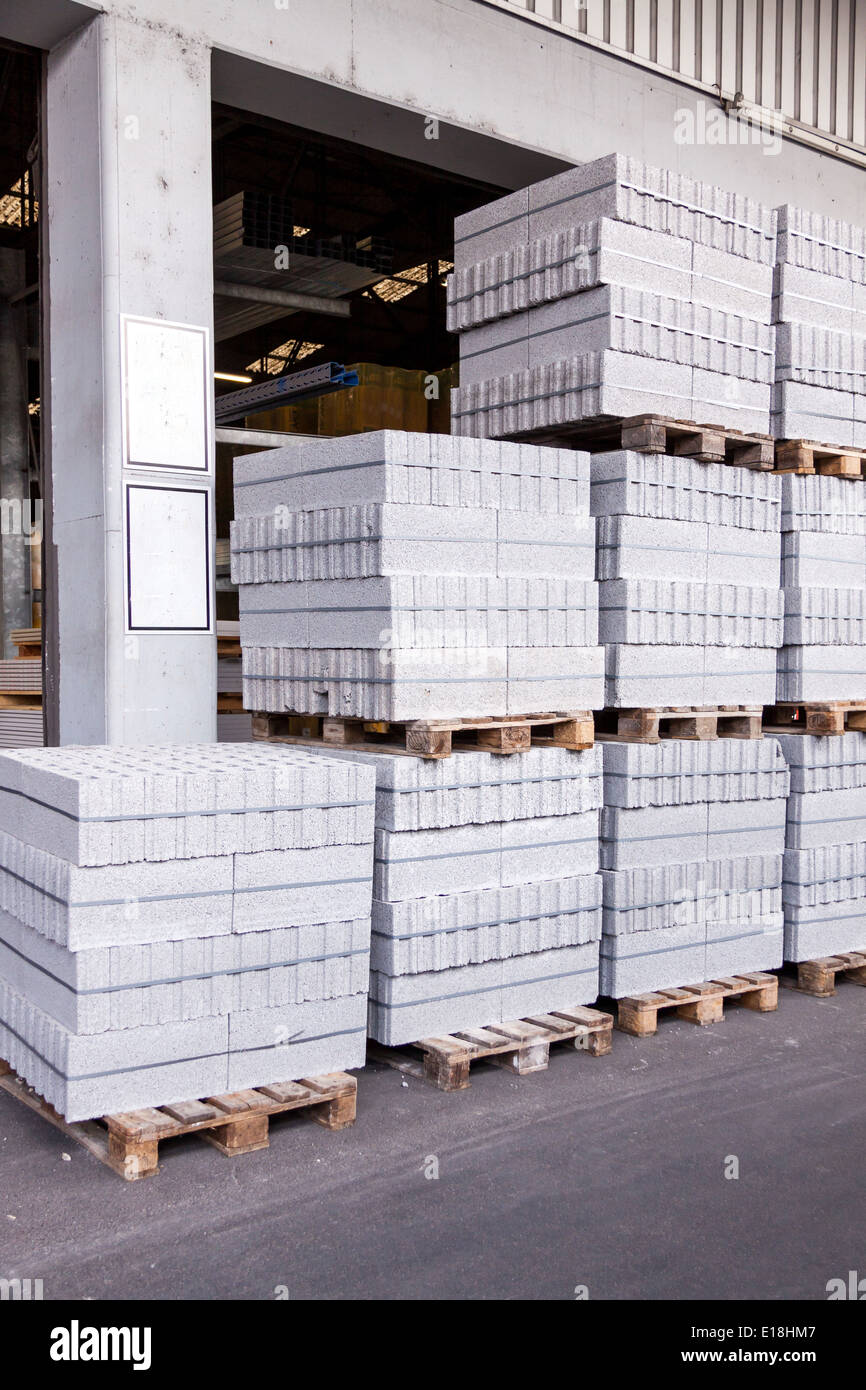 Cement building blocks stacked on pallets Stock Photo - Alamy