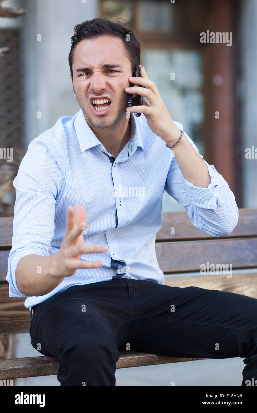 Man screaming cell hi-res stock photography and images - Alamy