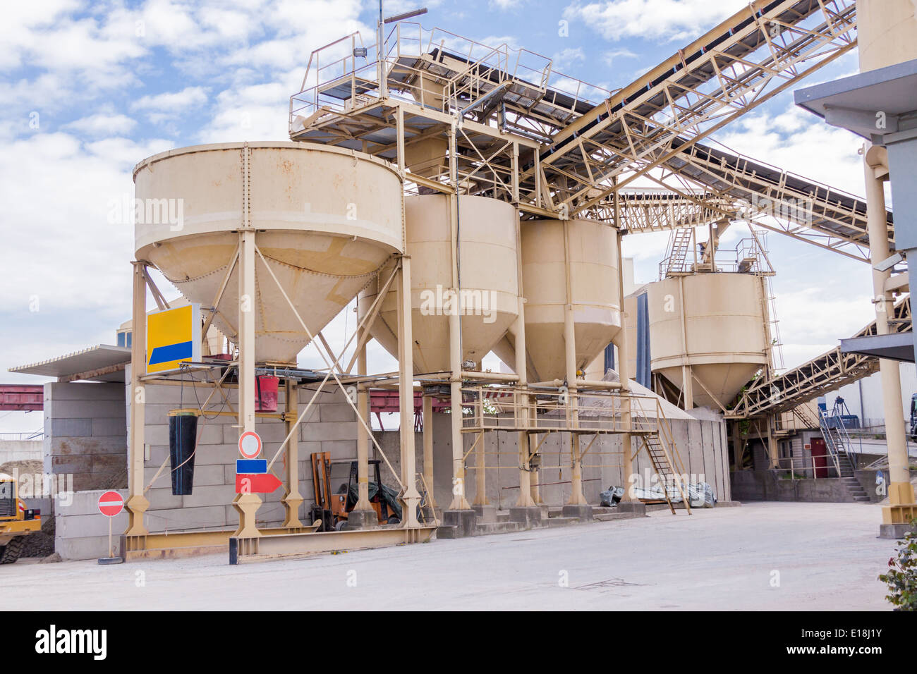 Metal tanks at a refinery plant or factory Stock Photo - Alamy
