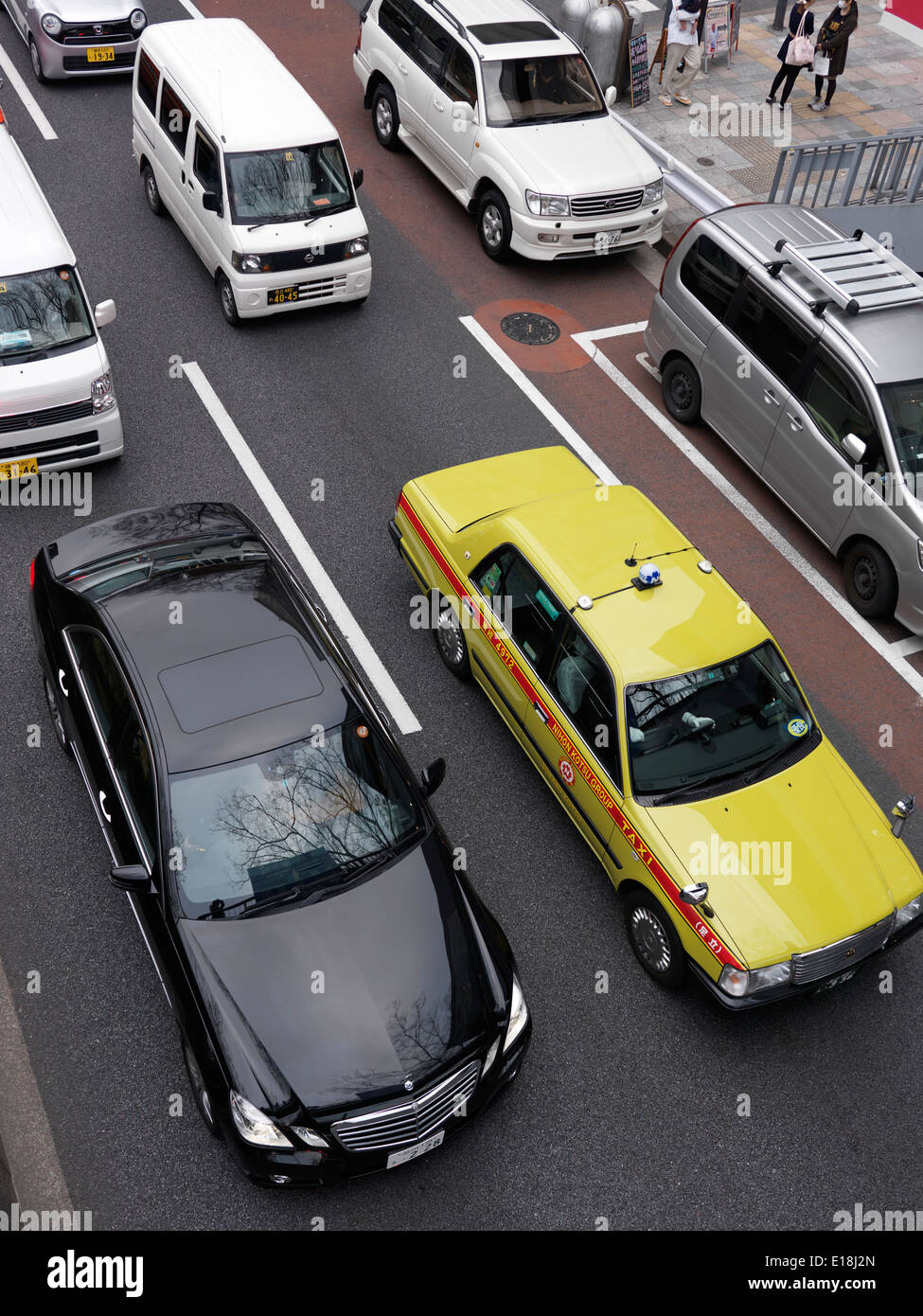 High angle view of cars and taxi on a street in Tokyo, Japan Stock ...
