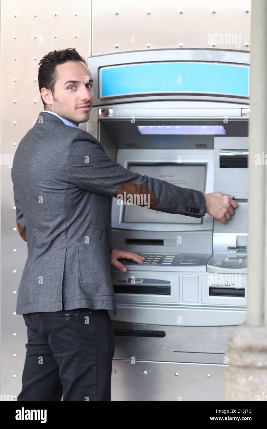 Atm man hi-res stock photography and images - Alamy